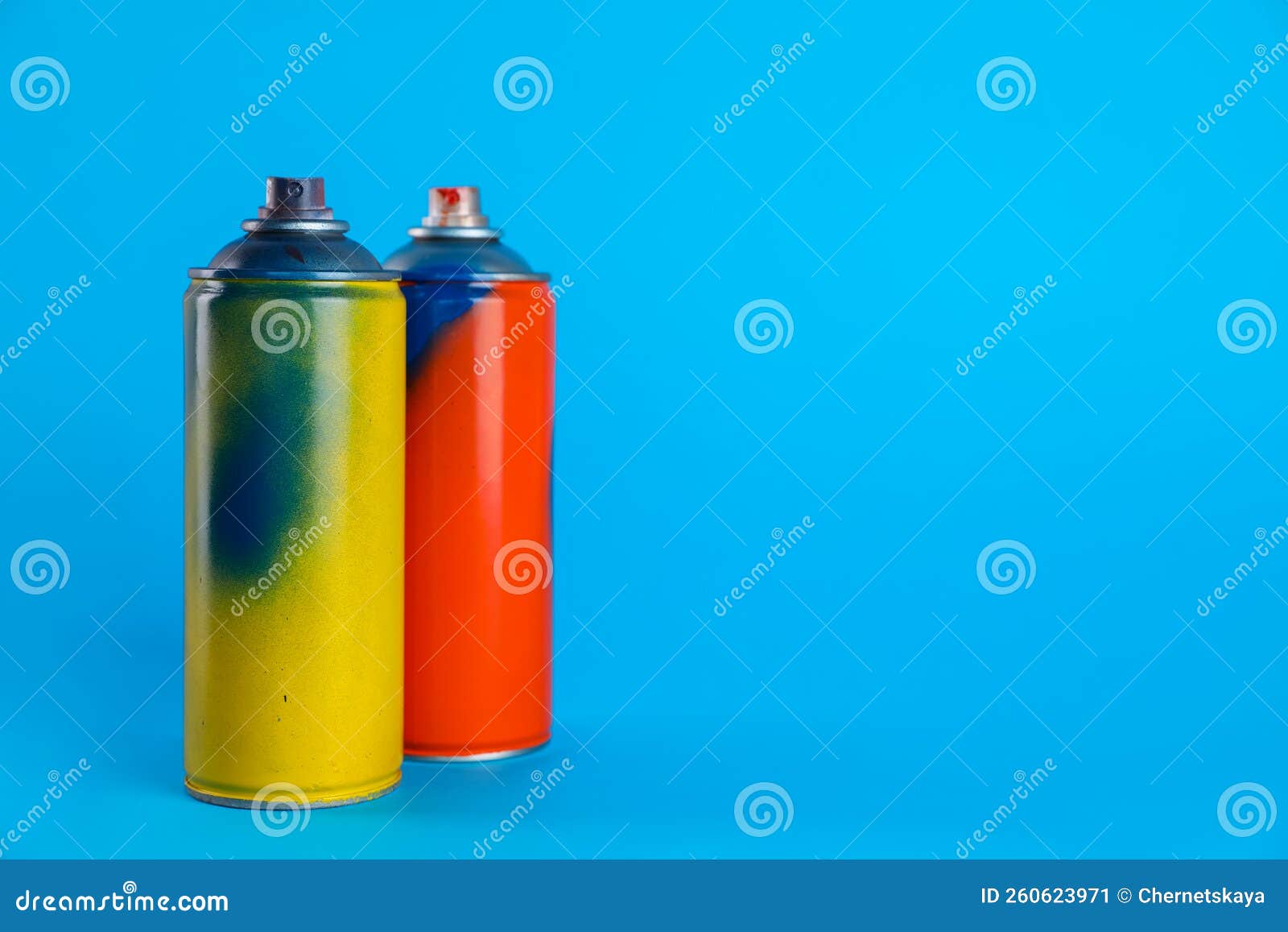 Used Cans of Spray Paints on Light Blue Background. Space for Text ...