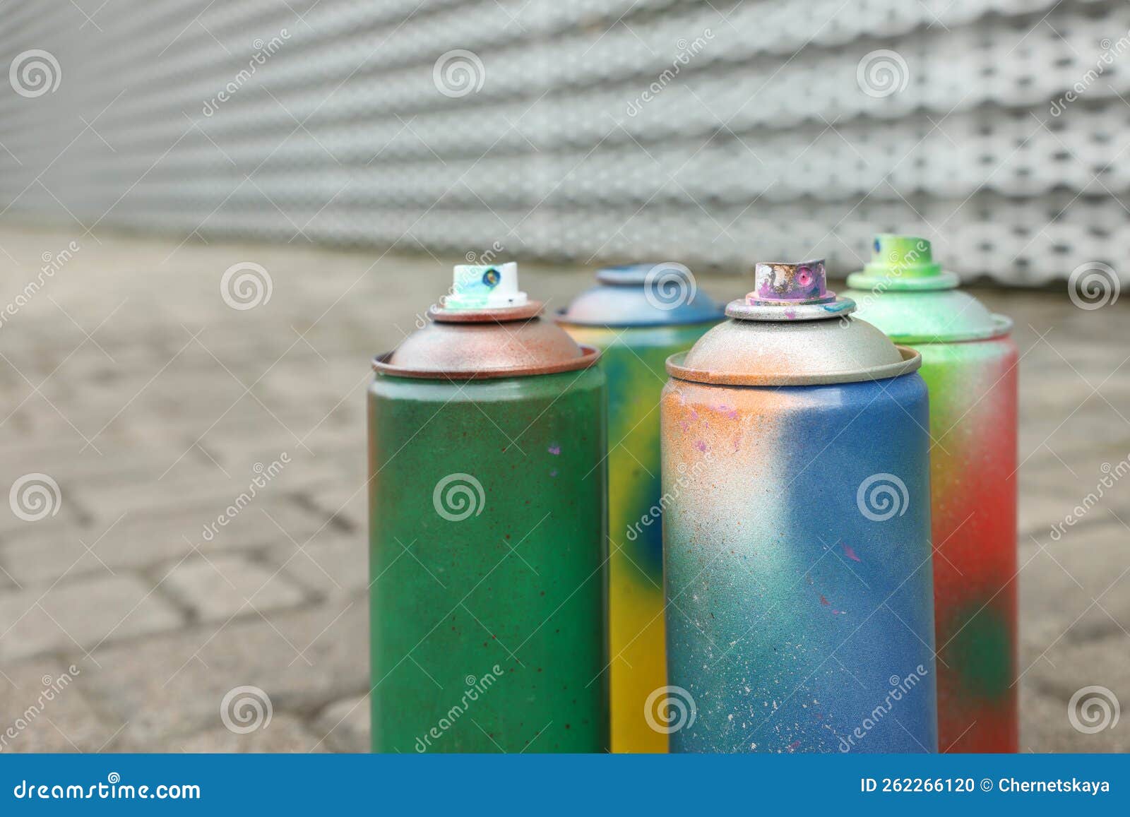 Used Cans of Spray Paints on Pavement, Closeup Stock Photo - Image of ...