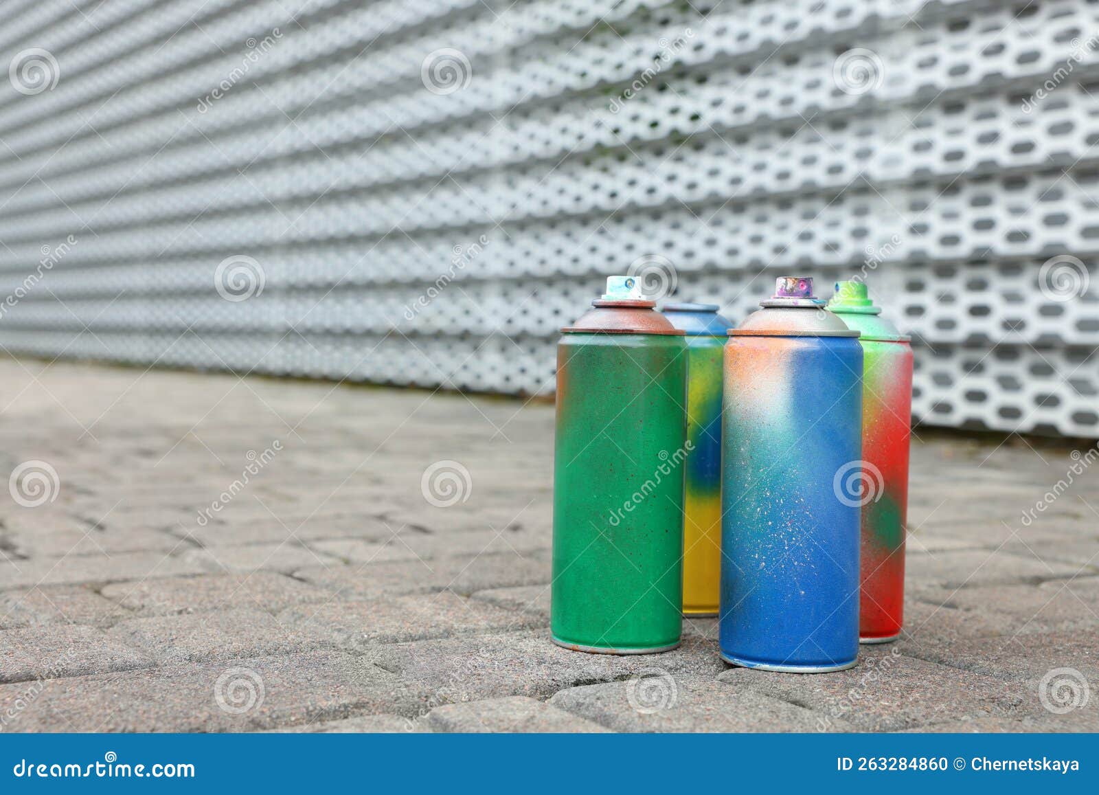 Used Cans of Spray Paints on Pavement, Space for Text Stock Photo ...