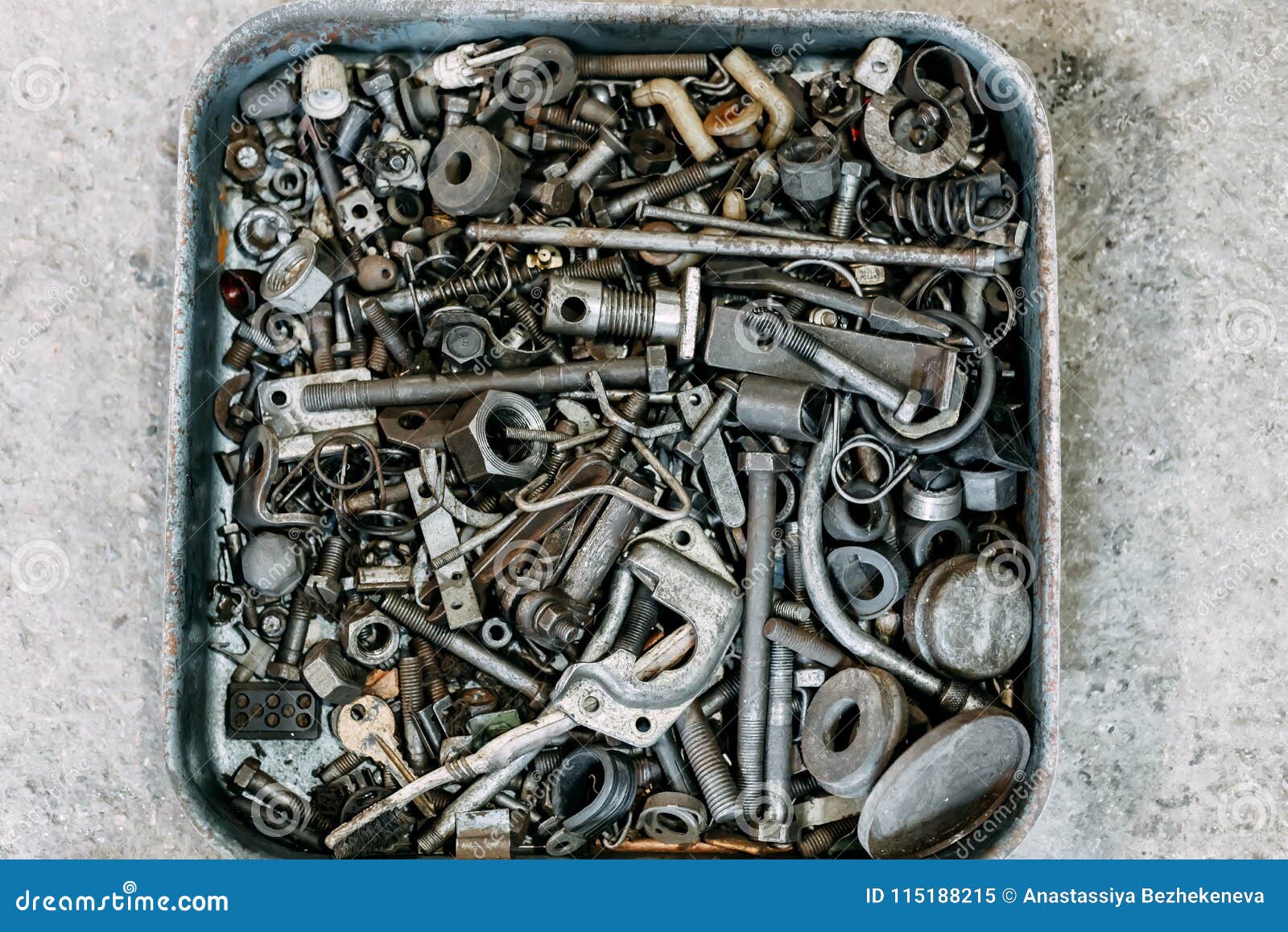 A Dirty Tool For Laying Ceramic Tiles Is On The Floor. Toothed Spatula ...