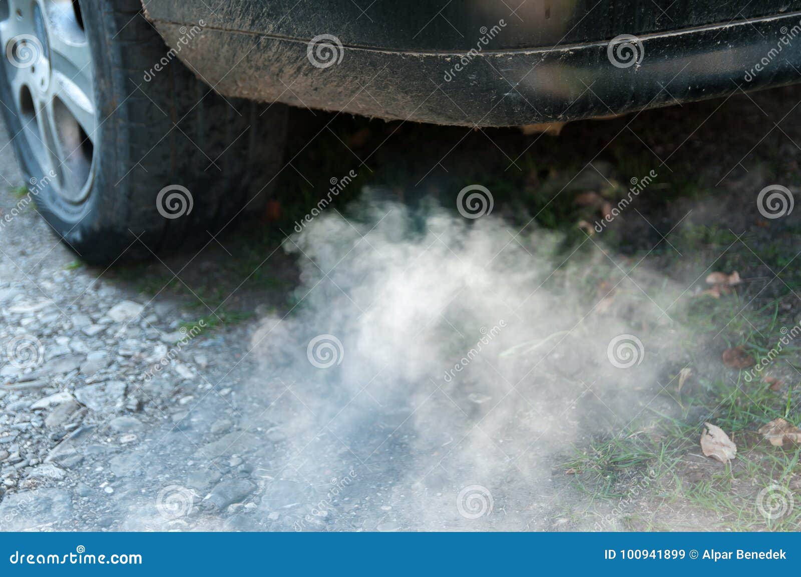 Used car polluting . stock image. Image of concentration - 100941899