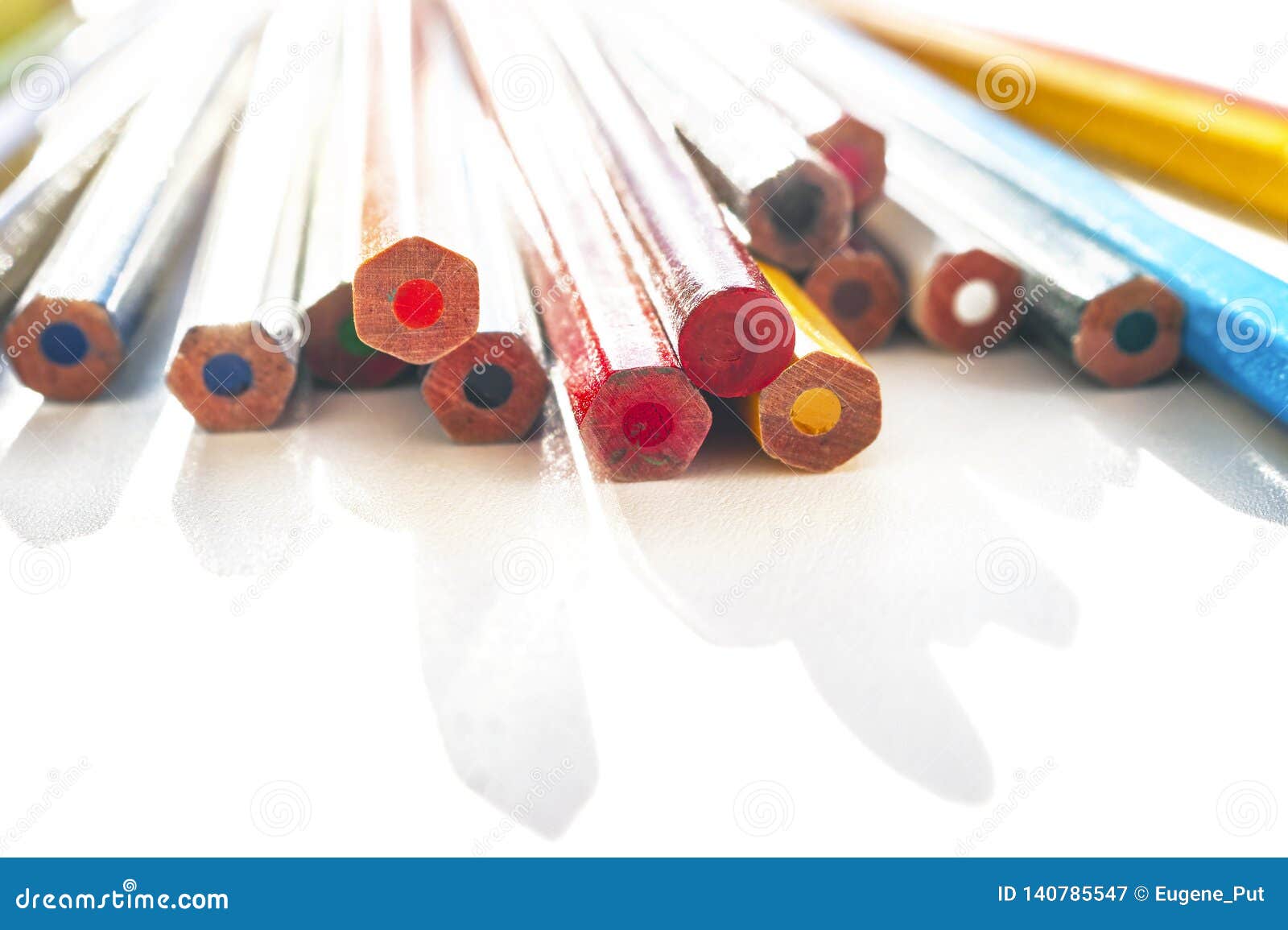 Used Color Pencils Casting Shadows on White Background. Sun Glow ...