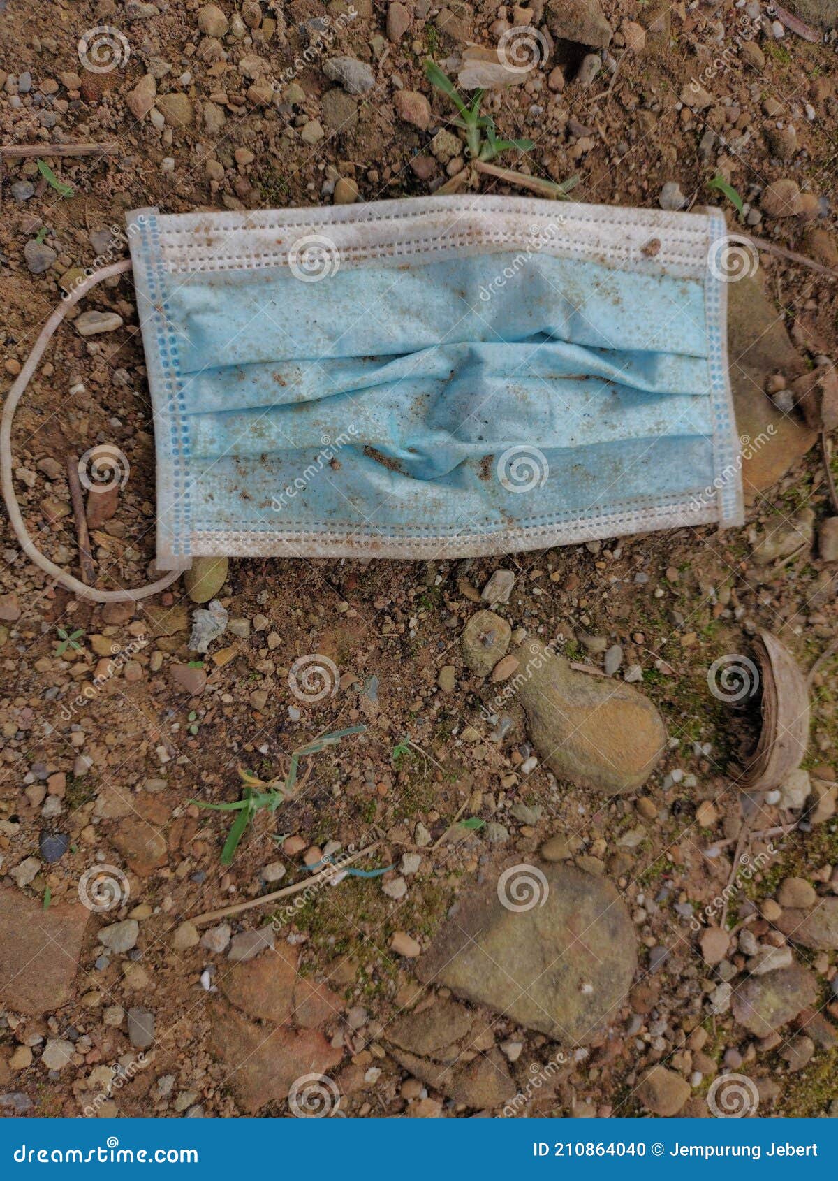 Used Discarded Mask on the Ground Stock Photo - Image of wall, spring ...