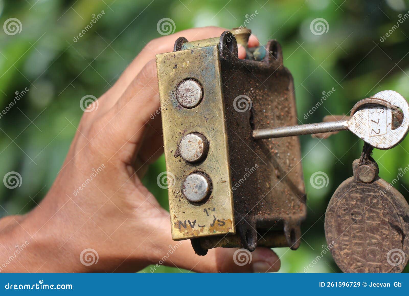 Used Door Lock with Double Lock System Held in Hand with Keys Stock ...