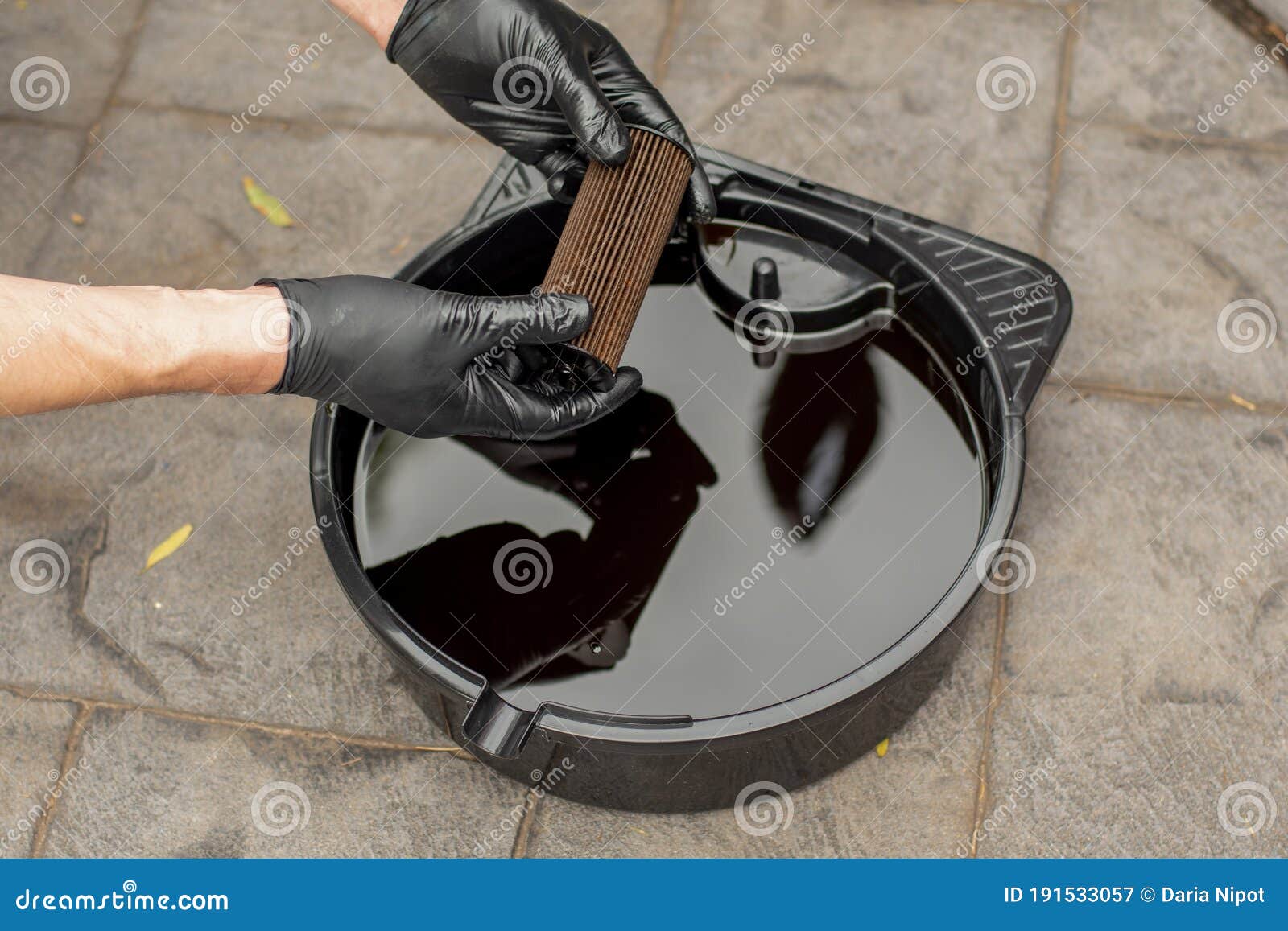 Used Drained Motor Oil in a Black Tray and Used Oil Filter. DIY Change ... Used Drained Motor Oil in a Black Tray and Used Oil Filter. DIY Change ...