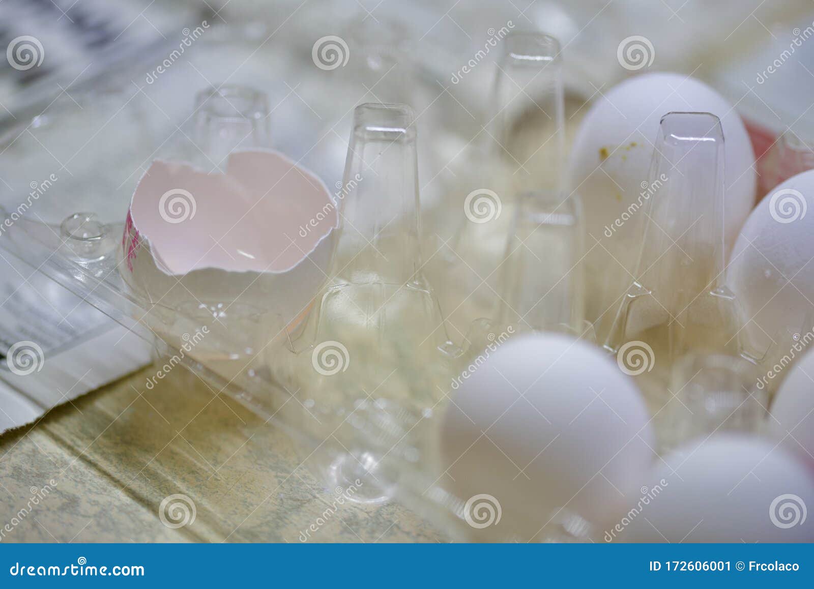 Used and Empty Egg Shell with Whole Raw Eggs in Plastic Carton Stock ...
