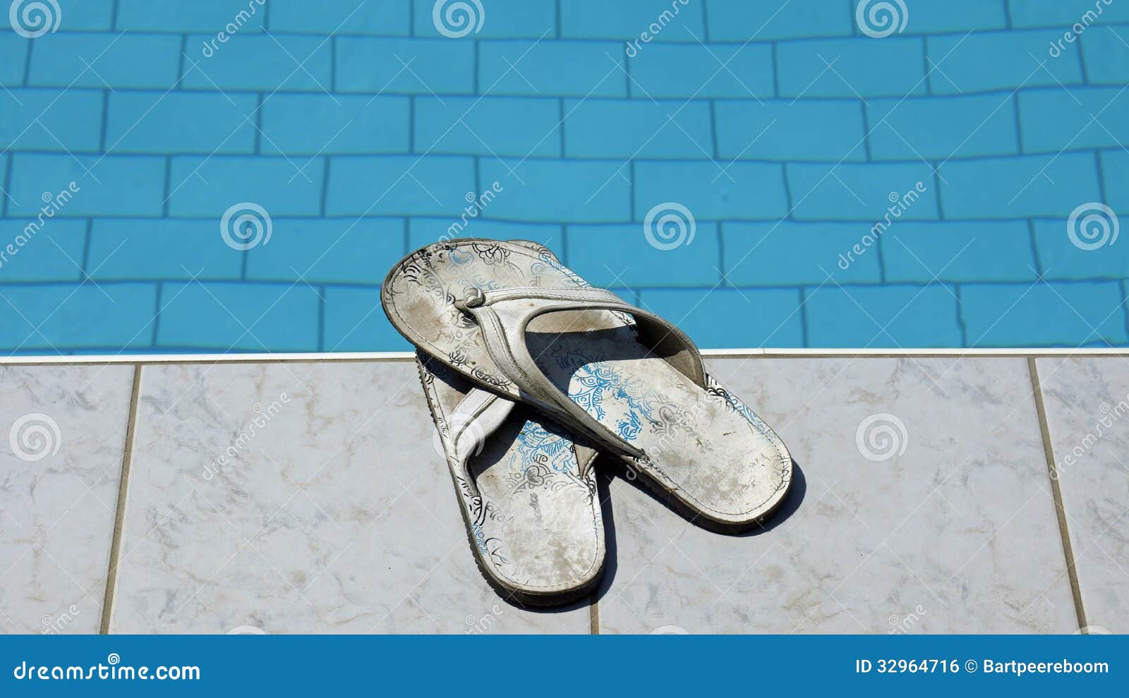 Used flip flops at a pool stock photo. Image of swimming - 32964716