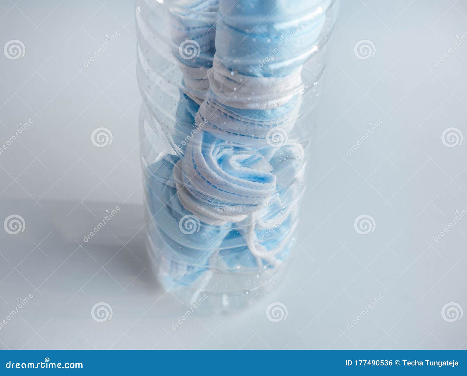 Used Mask Concept. Folded Used Protective Face Mask before Littering ...