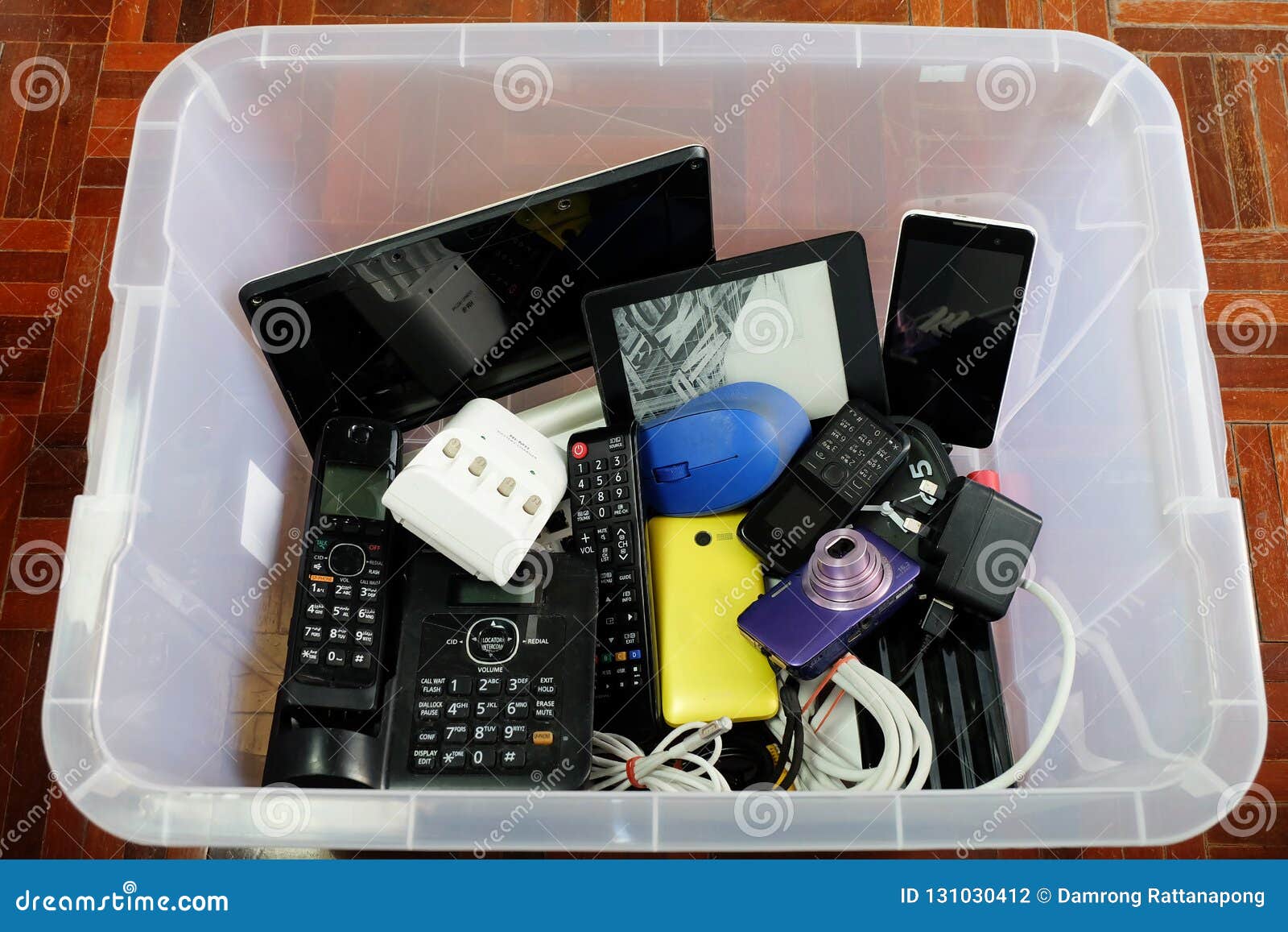 Used Modern Electronic Gadgets For Daily Use On Wooden Floor, Reuse And ...