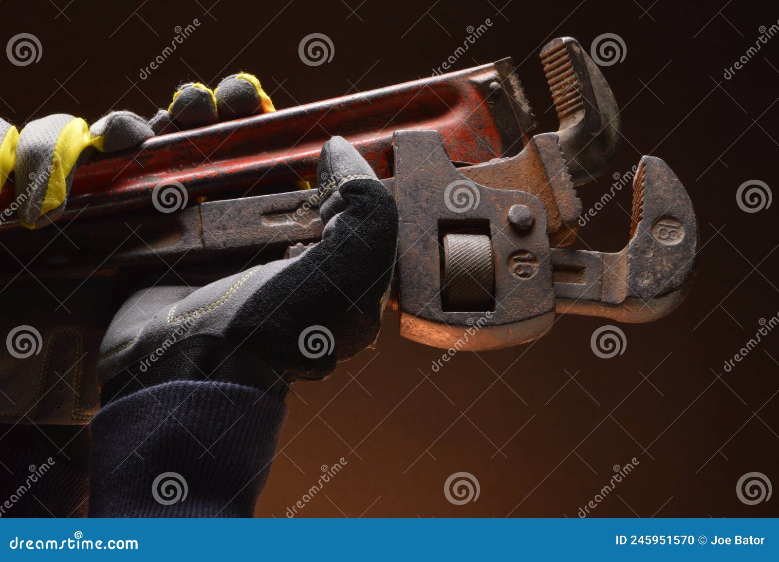 Pipe Wrenches in Hand of Workman Stock Photo - Image of tools, strength ...