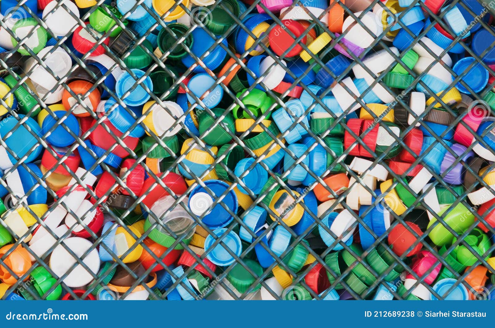 Used Plastic Bottle Stoppers in a Metal Container Editorial Stock Photo ...