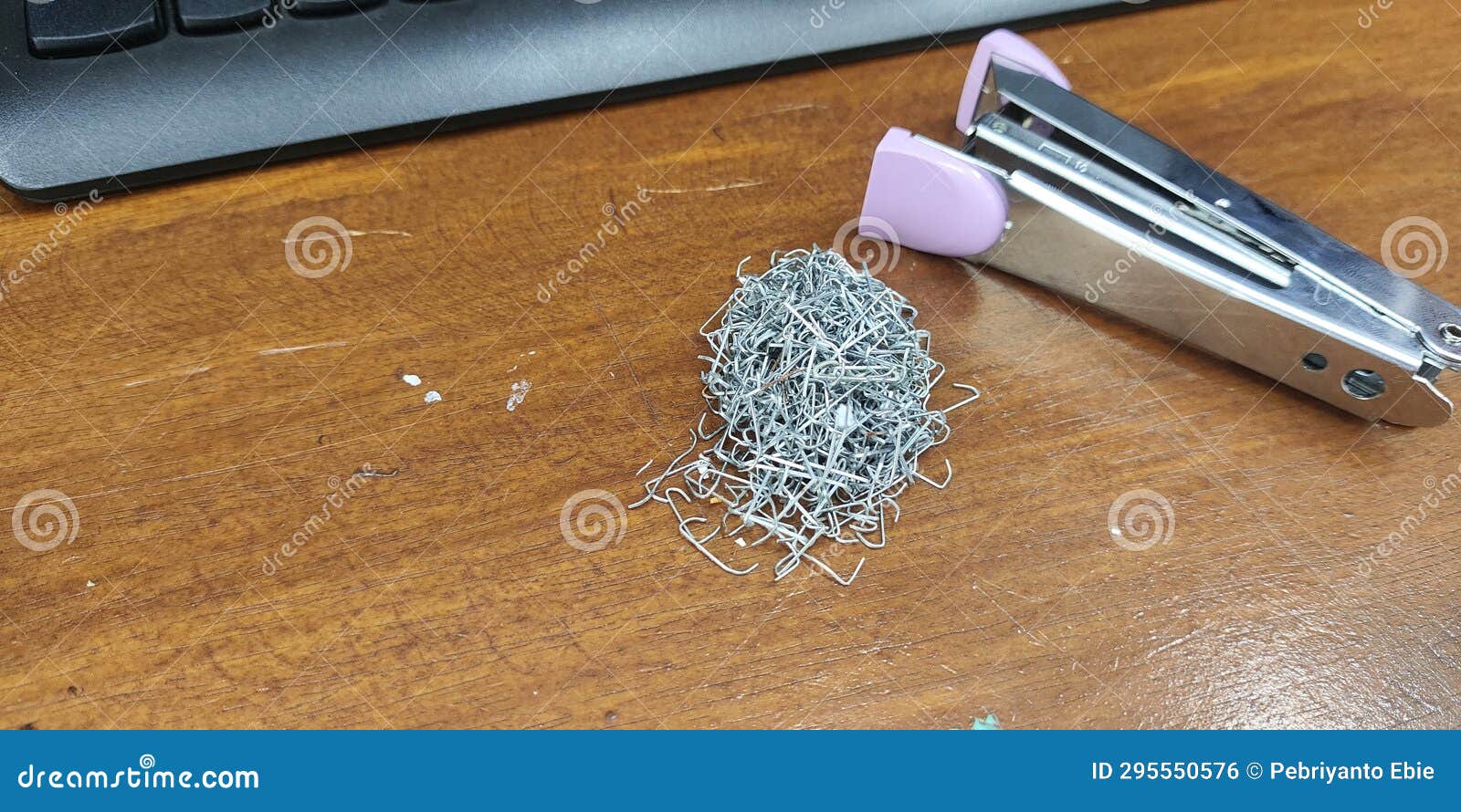 Used Staplers and Staples Piled Up on the Work Table Stock Photo ...