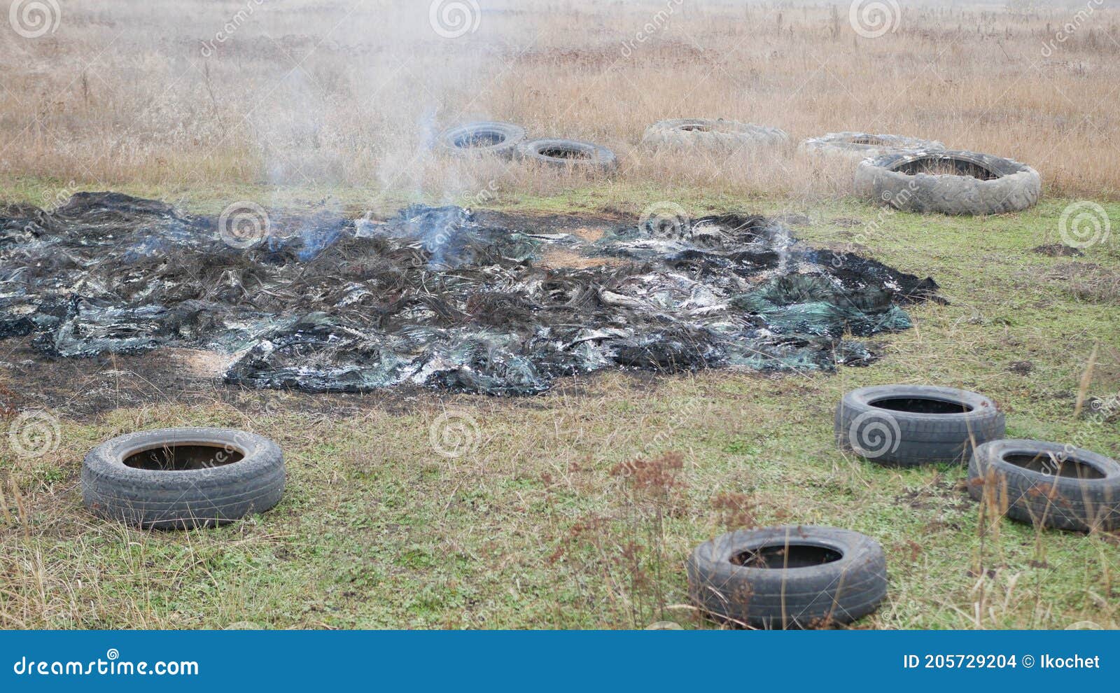 Used Tires Lie Around a Fire in Which Rubber is Burned Stock Photo ...
