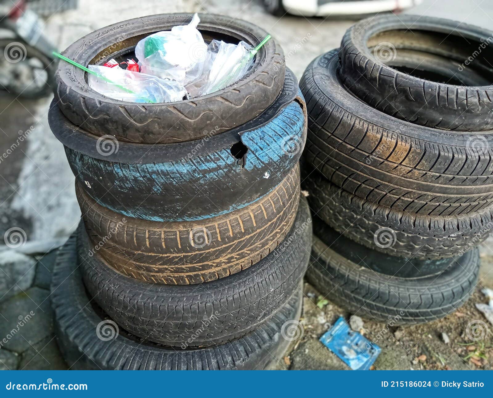 Used tires for trash bin stock photo. Image of dirty - 215186024