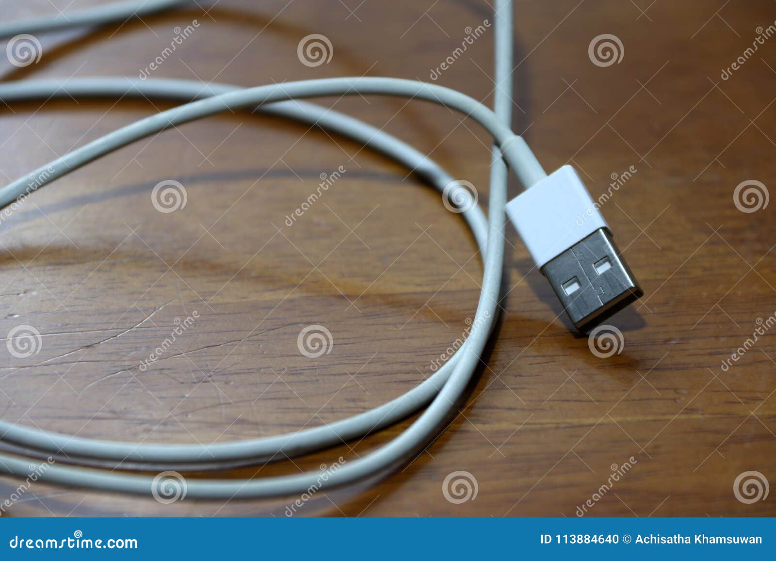 Used USB Plug with Cable on the Wooden Floor. Stock Photo - Image of ...