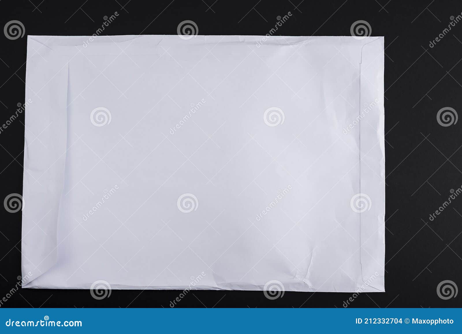Used White A4 Envelope on a Black Background Stock Photo - Image of ...