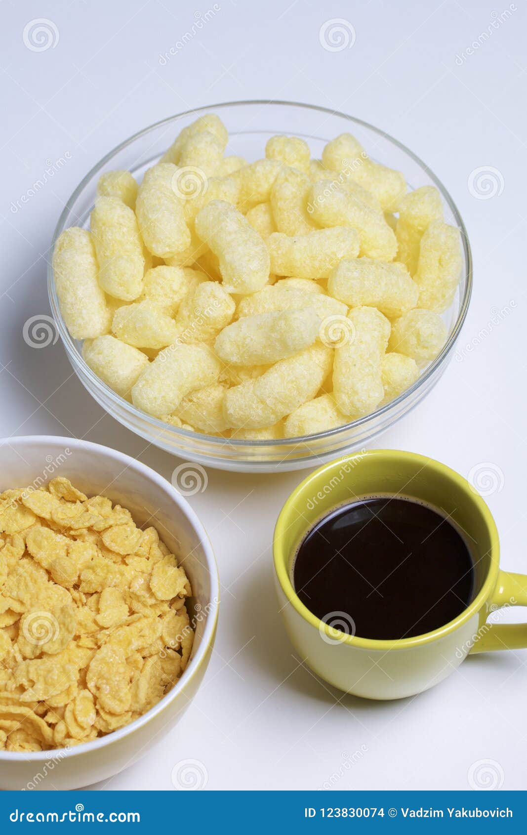 Useful Breakfast. Corn Sticks Flakes in a Container and a Mug of Coffee ...