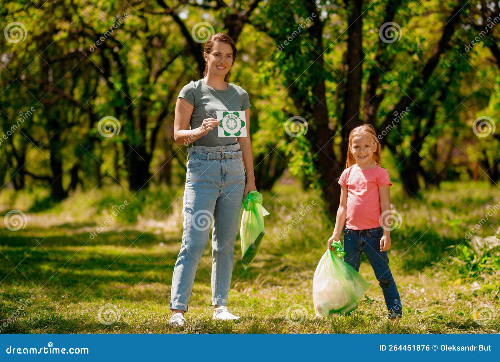 Cute Family Gathering Garbage in the Park Stock Photo - Image of woman ...