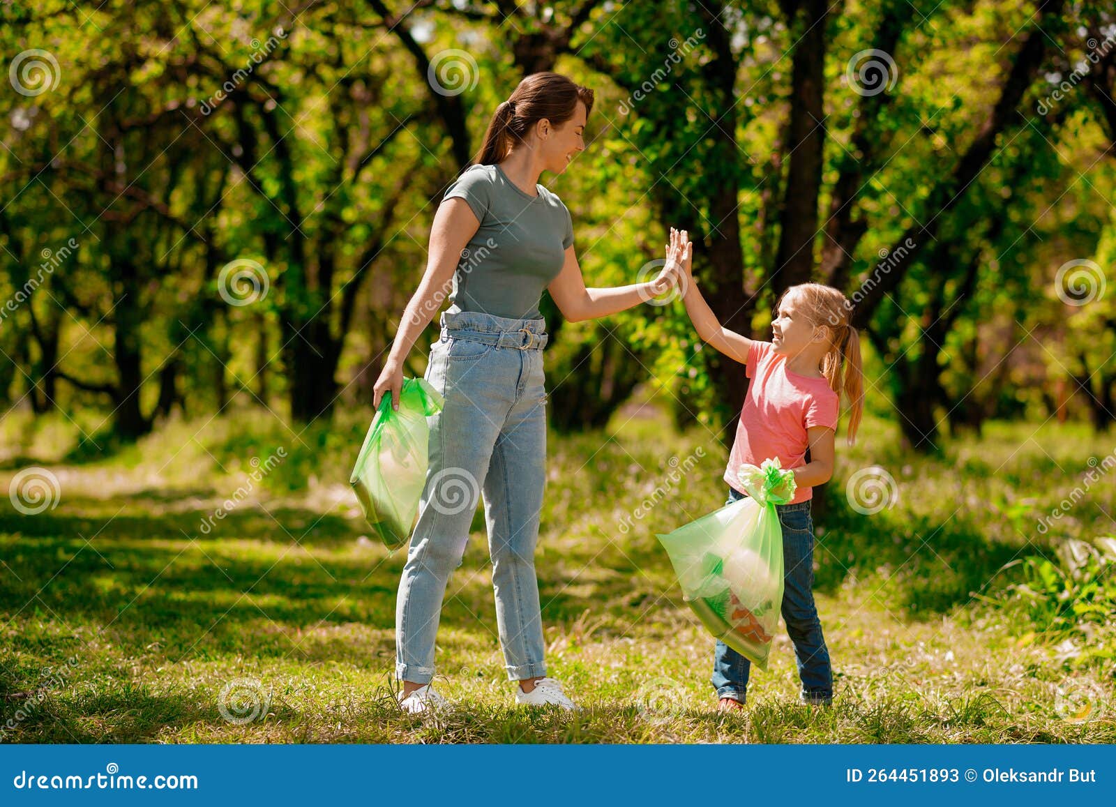Cute Family Gathering Garbage in the Park Stock Image - Image of ...