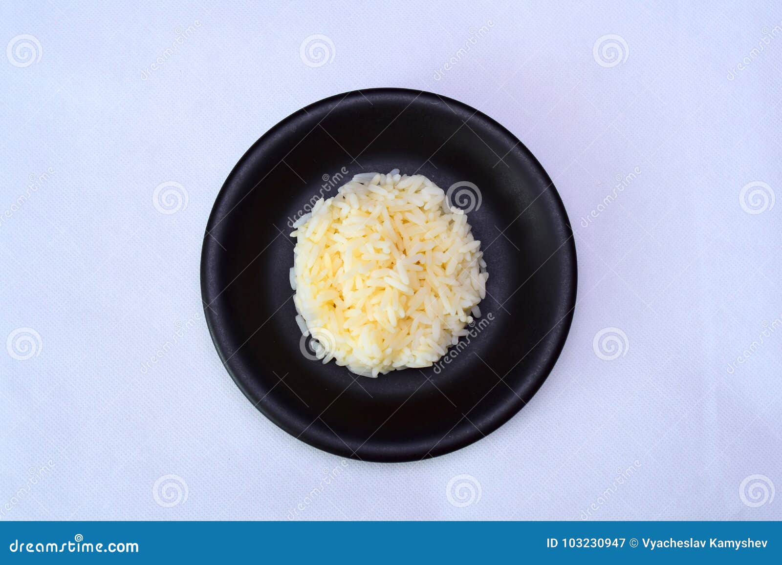 White Rice in a Black Plate Stock Image - Image of yellow, bowl: 103230947