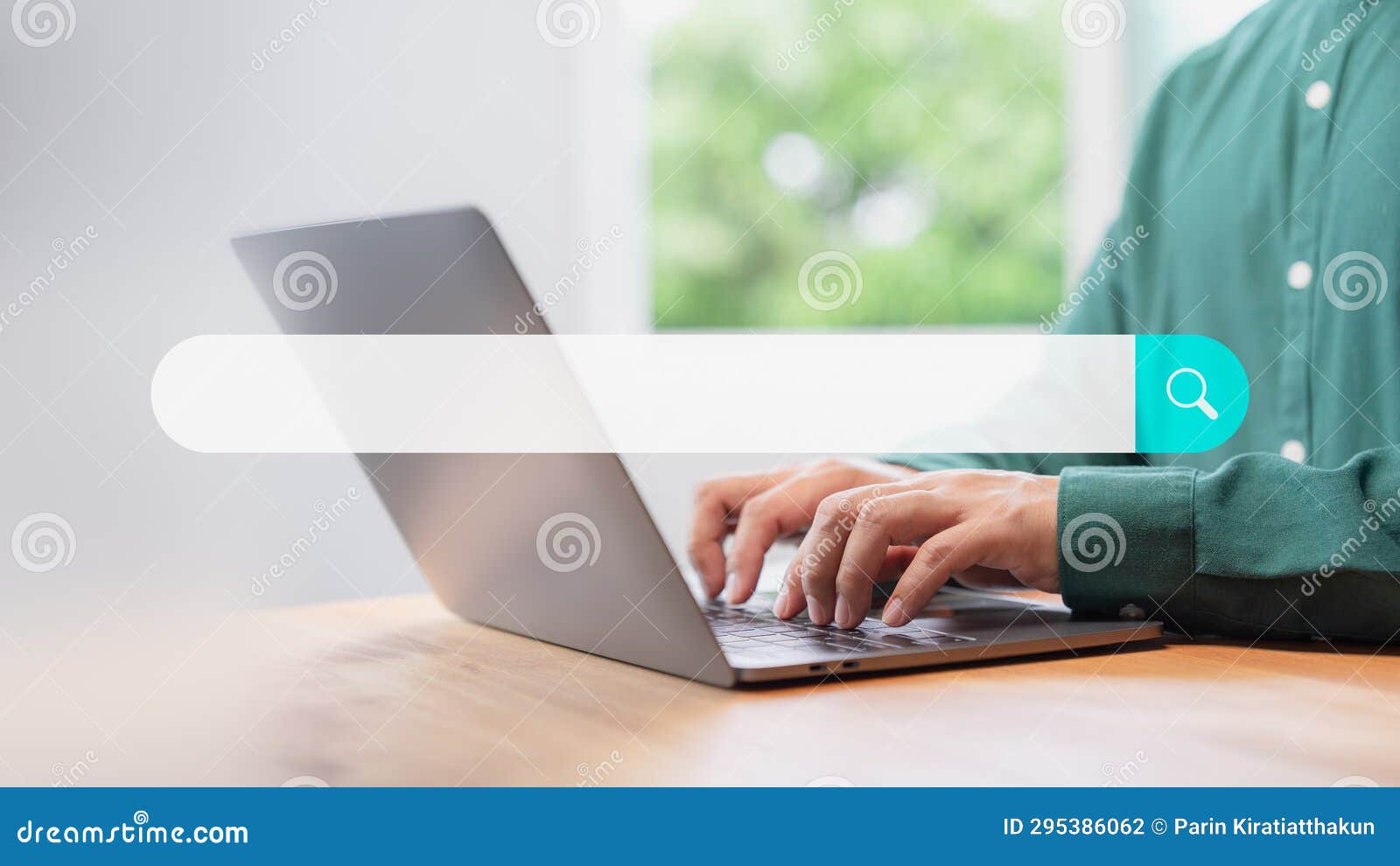 User Working with a Laptop Computer on Table in Office. Searching ...