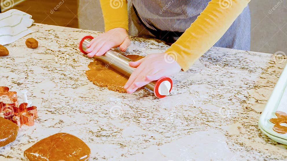 Baking Christmas Gingerbread Cookies in a Modern Kitchen Stock Image ...