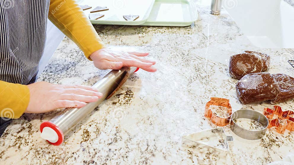 Baking Christmas Gingerbread Cookies in a Modern Kitchen Stock Photo ...