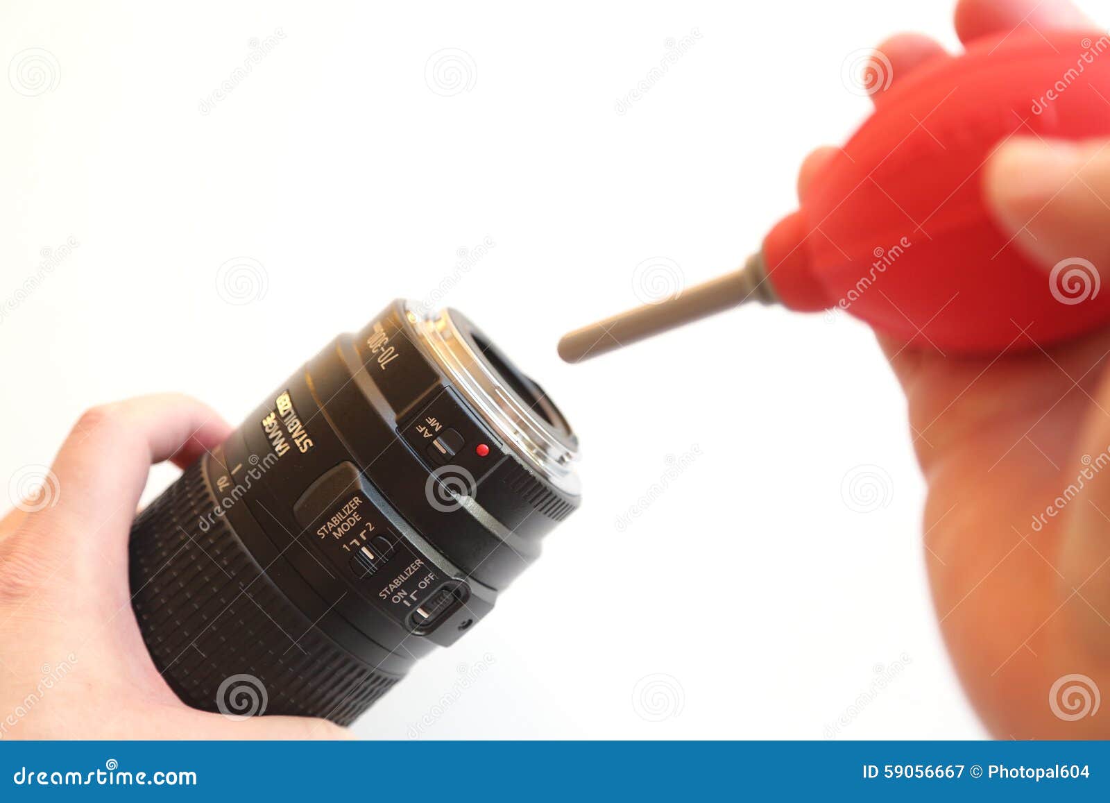 Using Air Pump To Clean Camera Lens Stock Image - Image of education ...