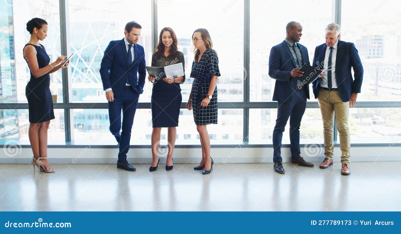 Using All the Resources they Can Find. a Group of Businesspeople ...