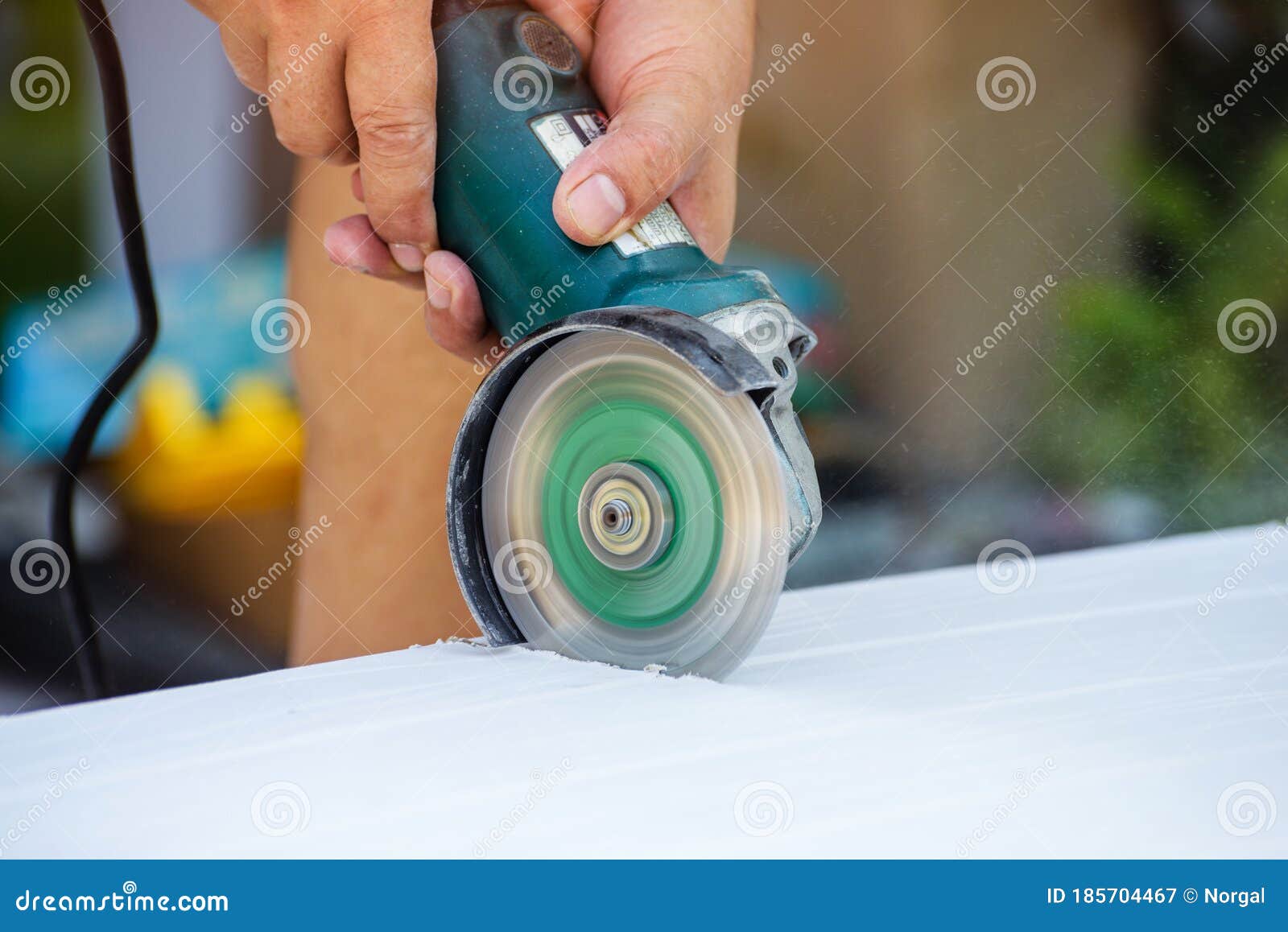 Using the angle grinder stock image. Image of power - 185704467