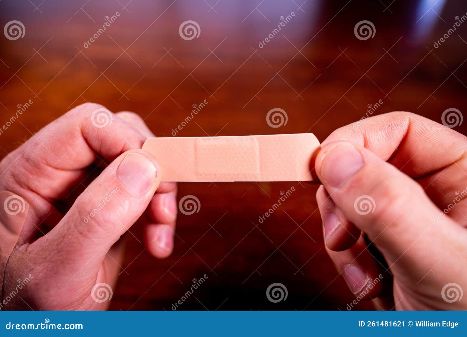 Using a band aid on a hand stock image. Image of medical - 261481621