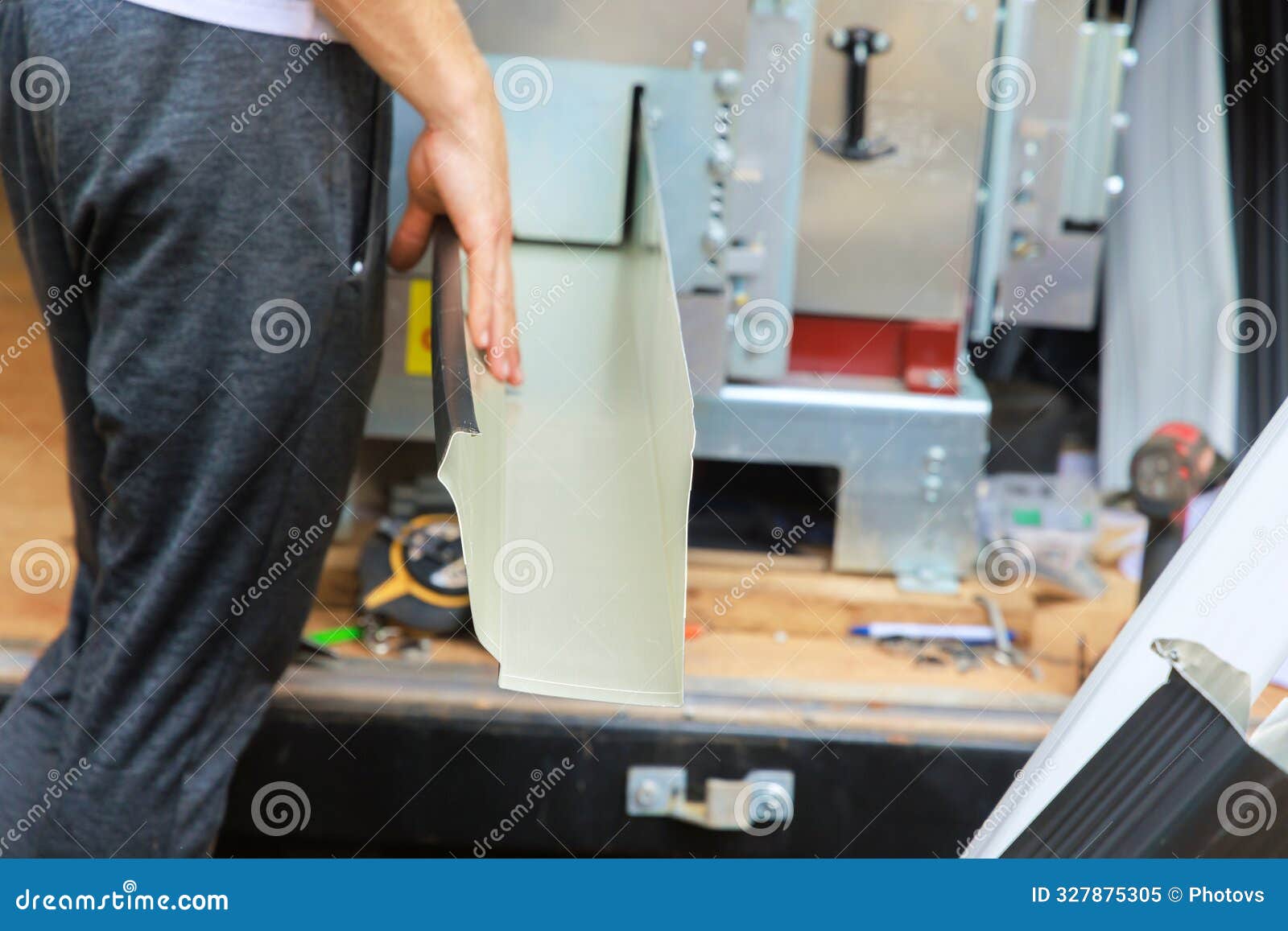 Using a Bending Machine Tool, Thin Metal Rain Gutters May Be Bent Stock ...