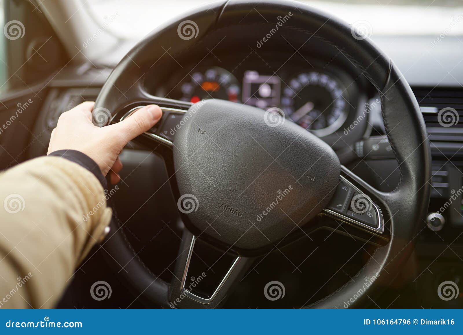 Using buttons on car wheel stock photo. Image of business - 106164796