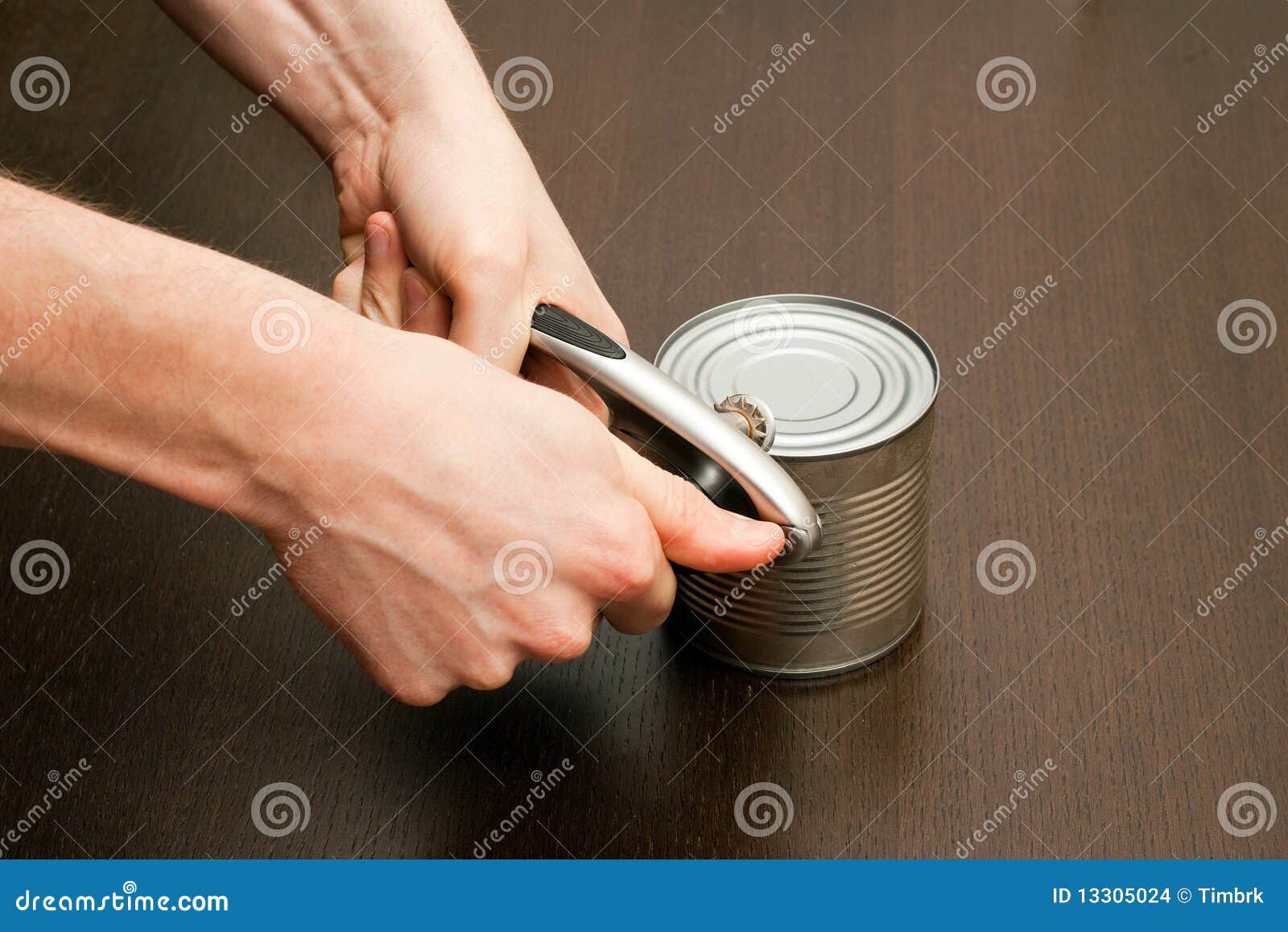 Using can-opener stock photo. Image of kitchen, human - 13305024