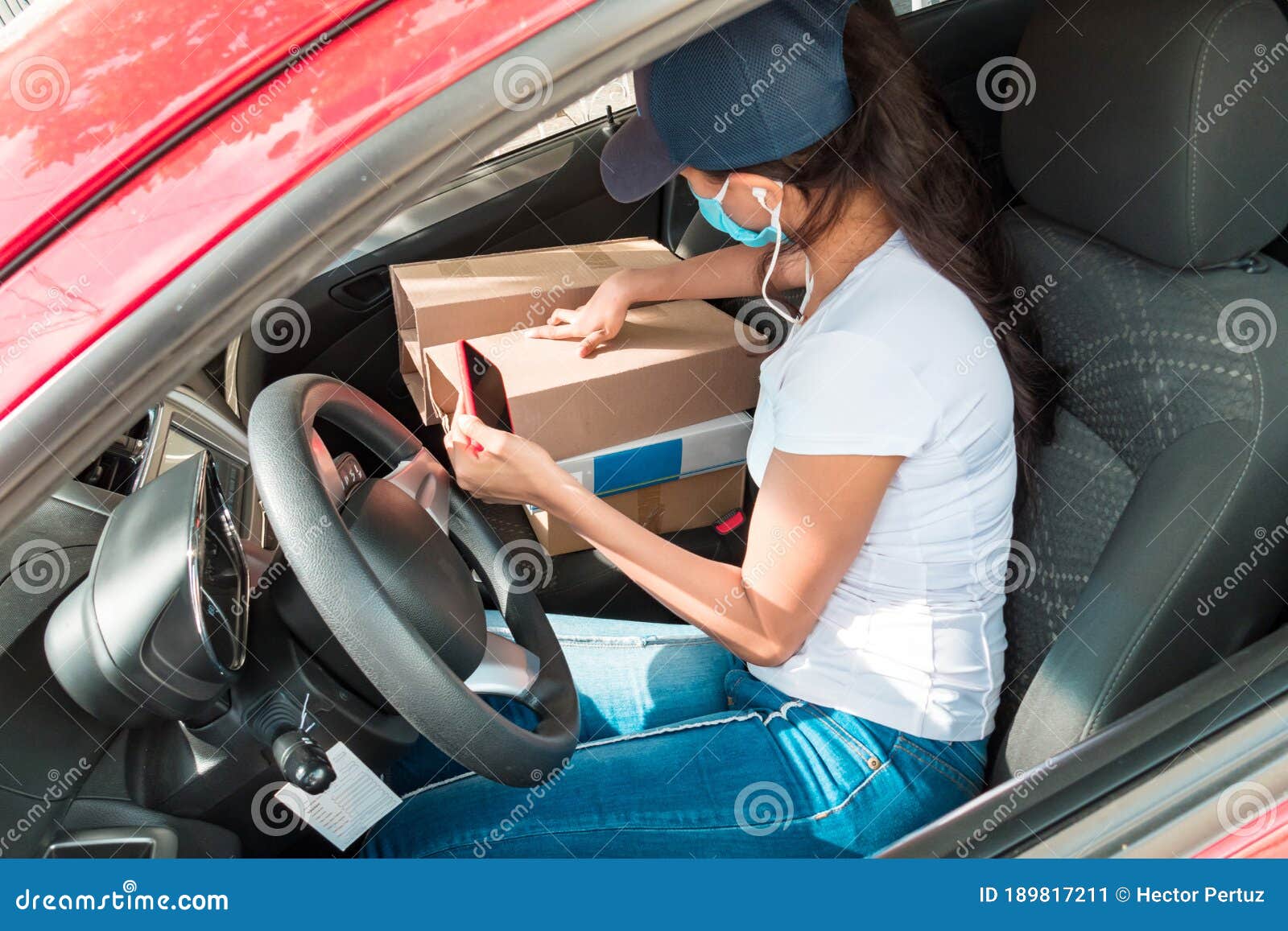 Using the Car with a Mask Handing Out Items Stock Image - Image of ...