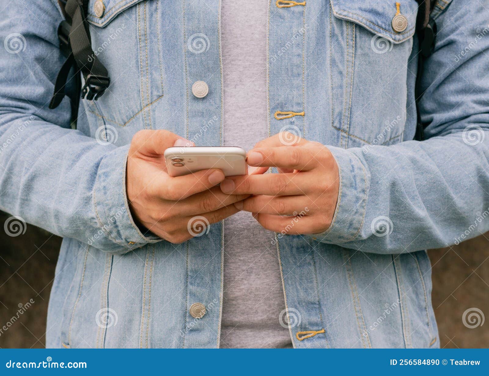 Using cell phone. Close up stock photo. Image of casual - 256584890