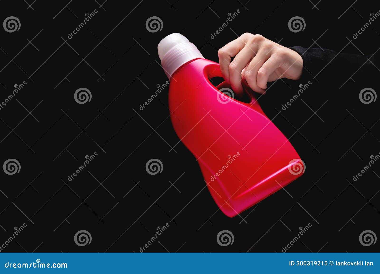Using a Chemical Bottle. Female Hand Holding Bleach or Liquid Laundry ...