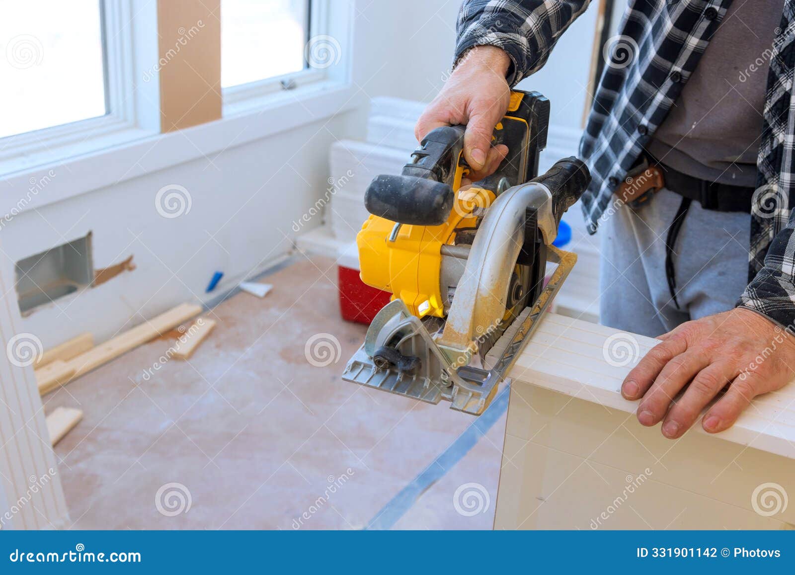 Using Circular Hand Saw, a Carpenter Cuts Wooden Boards Stock Photo ...