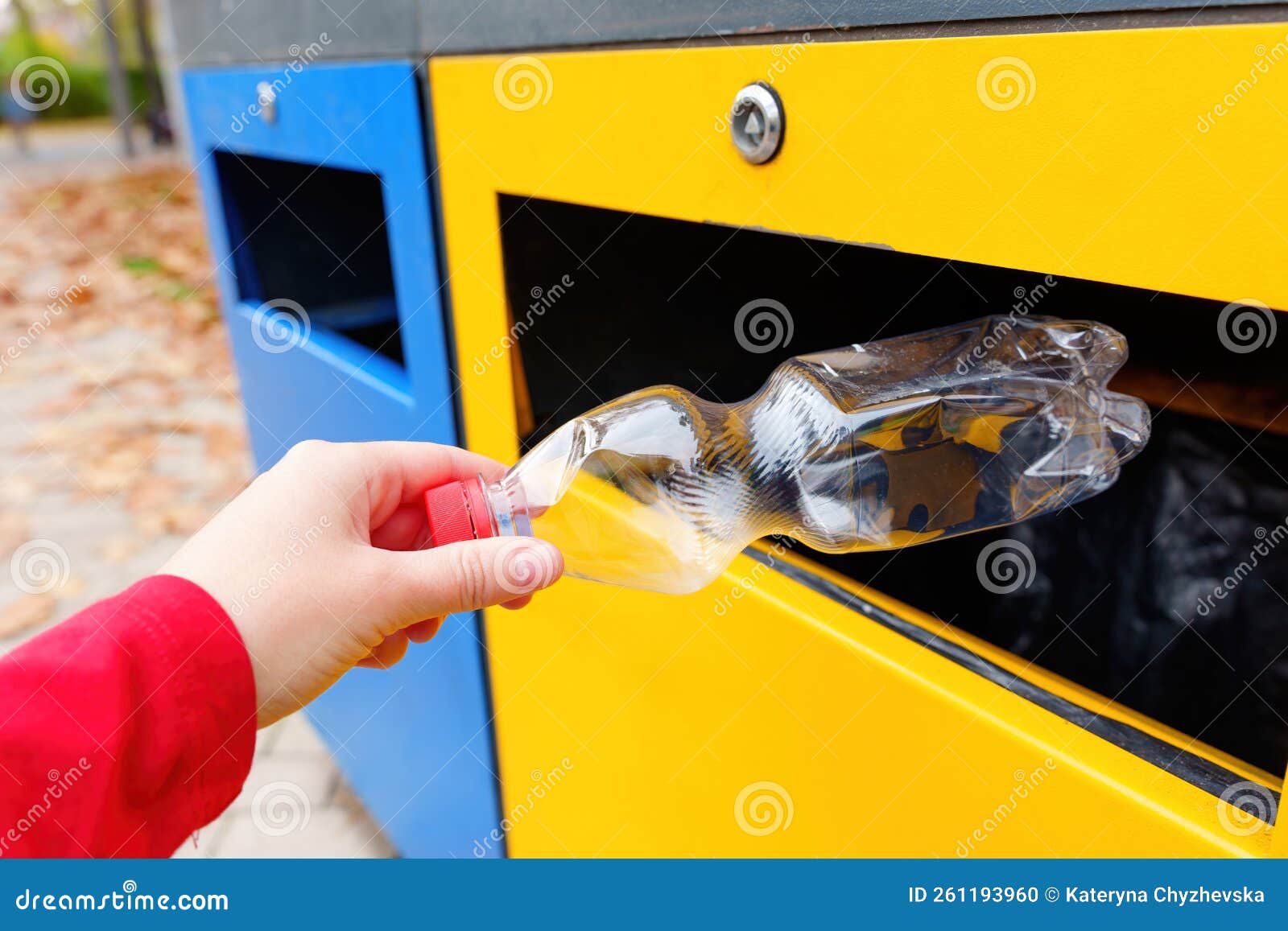 Using Color Coded Waste Recycling Bins in the Park Stock Photo - Image ...