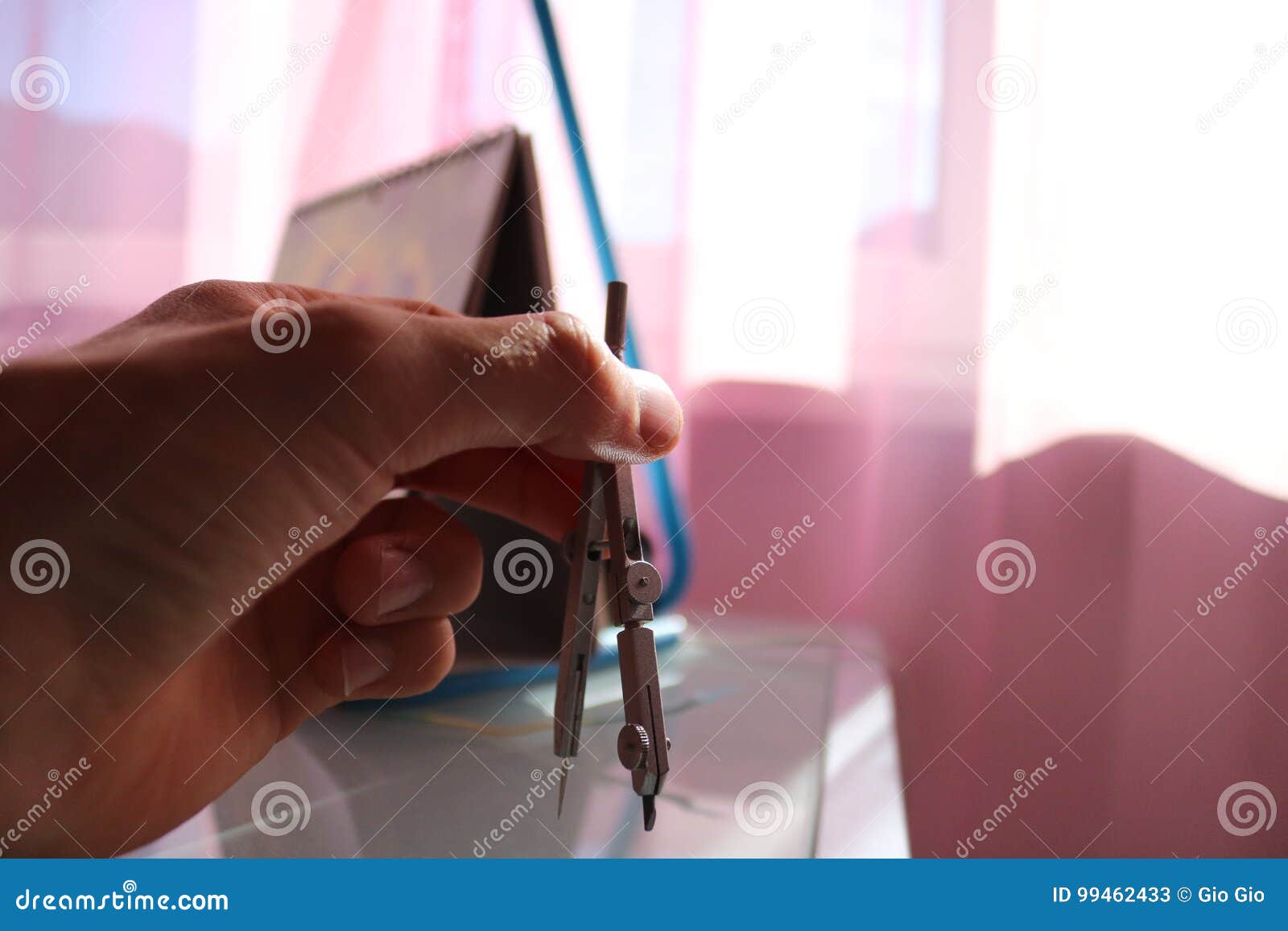 Using compass on a table stock image. Image of compass - 99462433