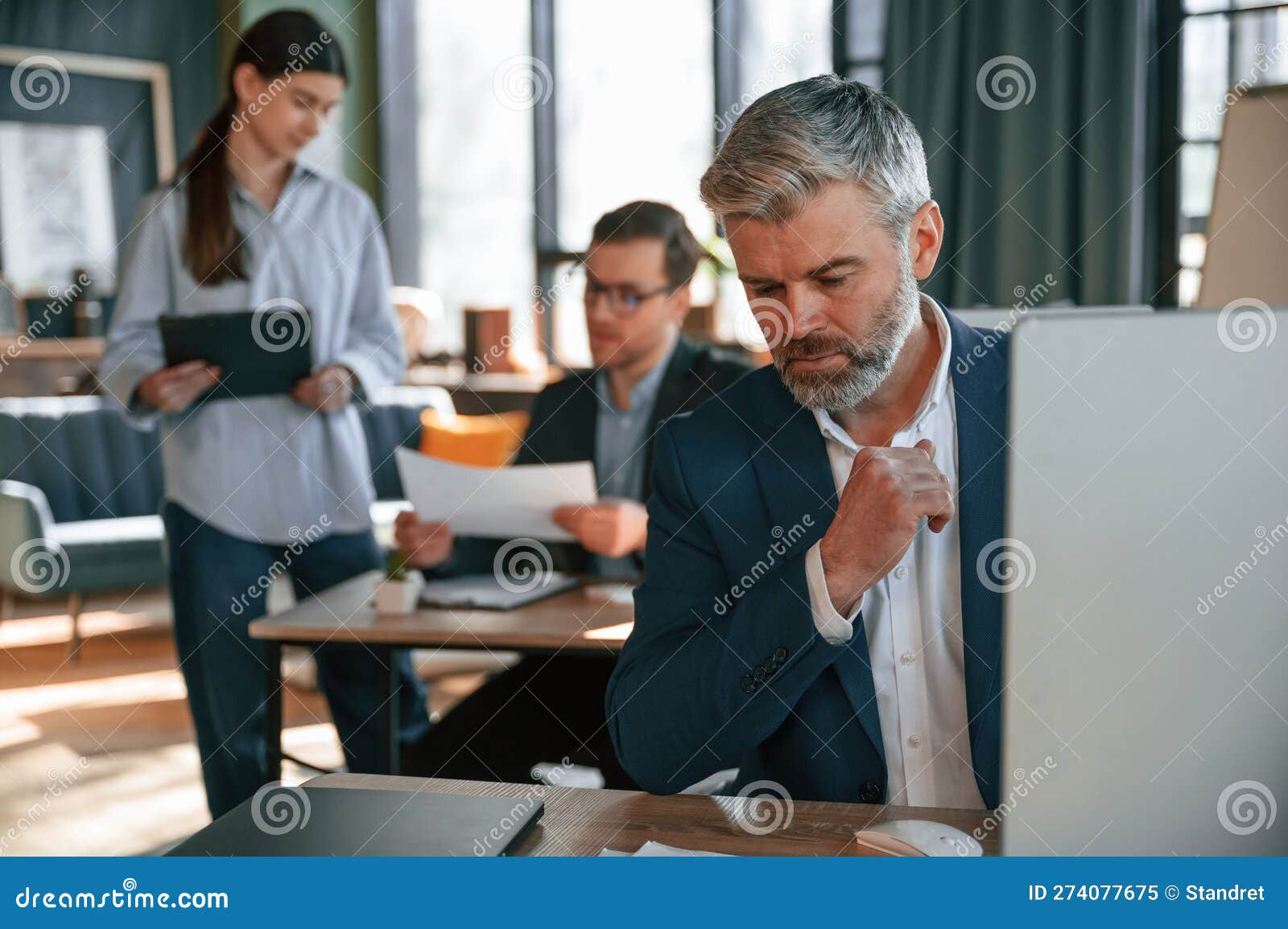 Using Computer. Group of Business People are Working in the Modern ...