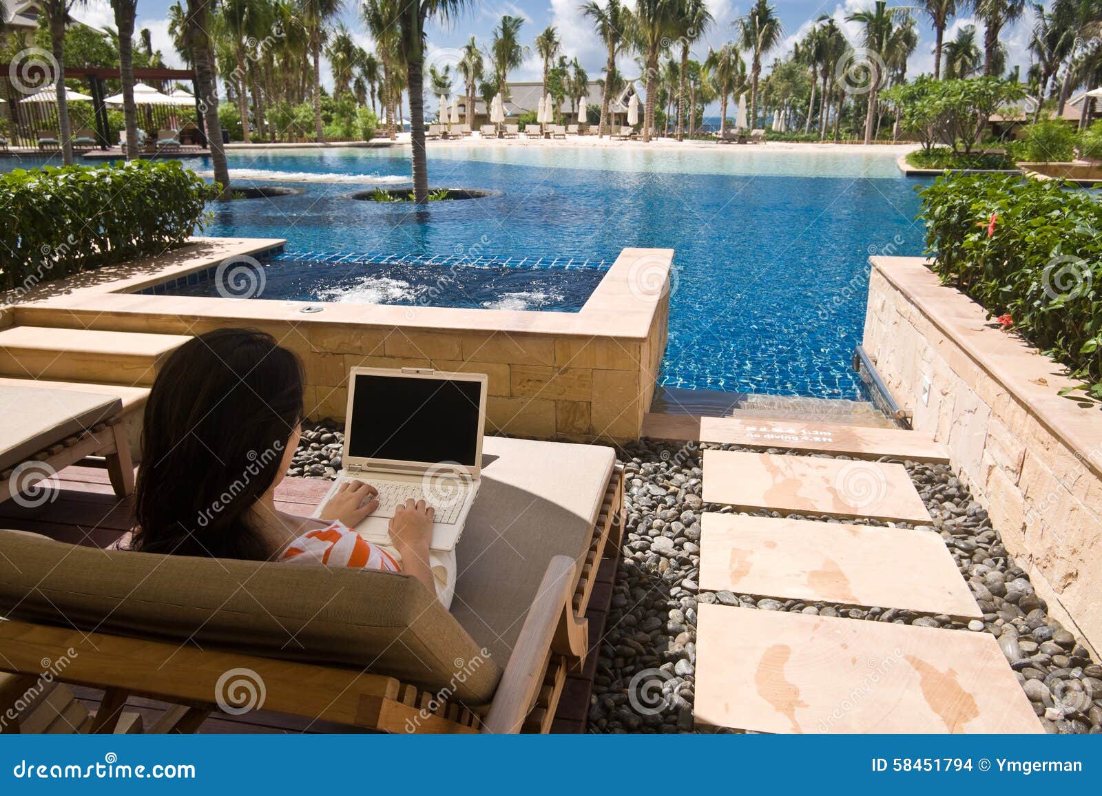 Using Computer at Hotel Lagoon Room Stock Photo - Image of side ...