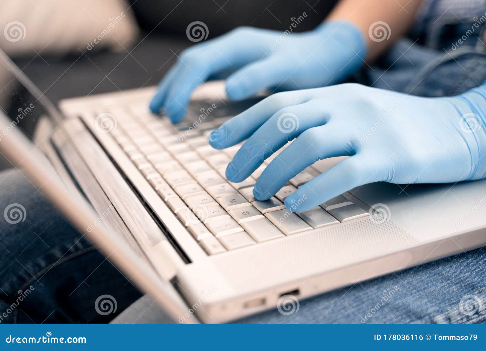 Using Computer Protected with Gloves during Coronavirus Pandemic Stock ...