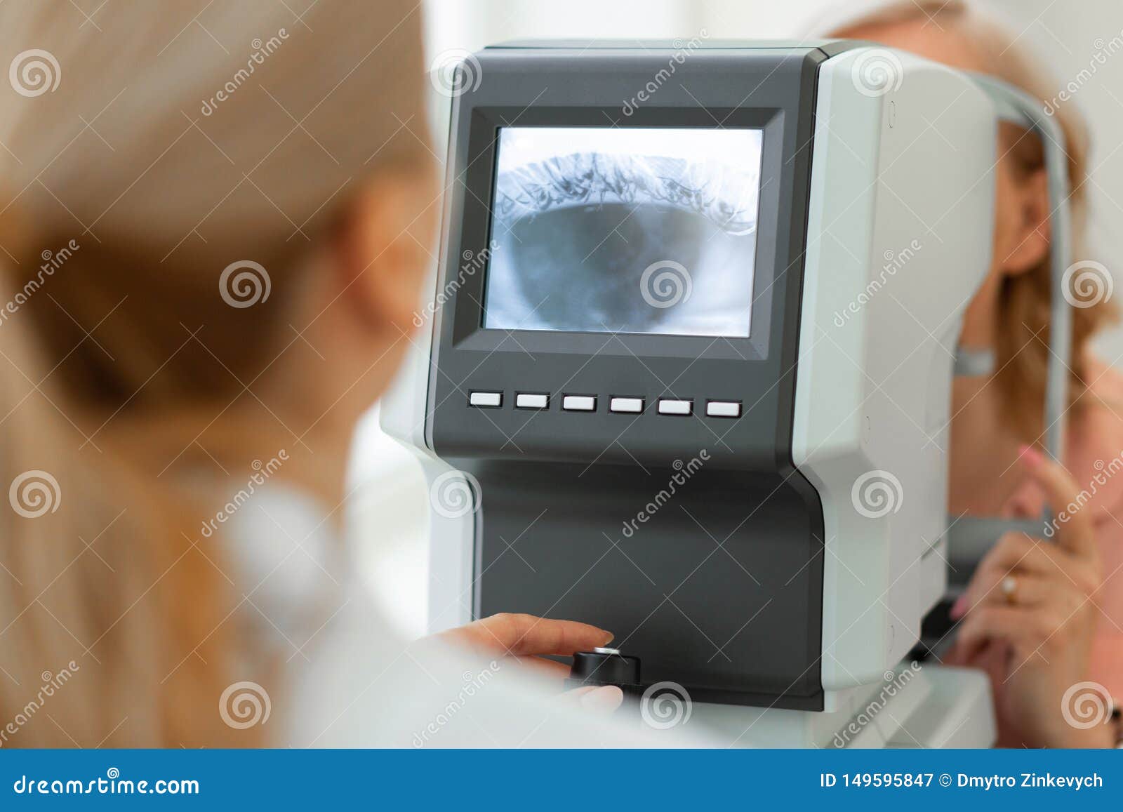 Attentive Professional Therapist Observing Eye Up Close on a Computer ...