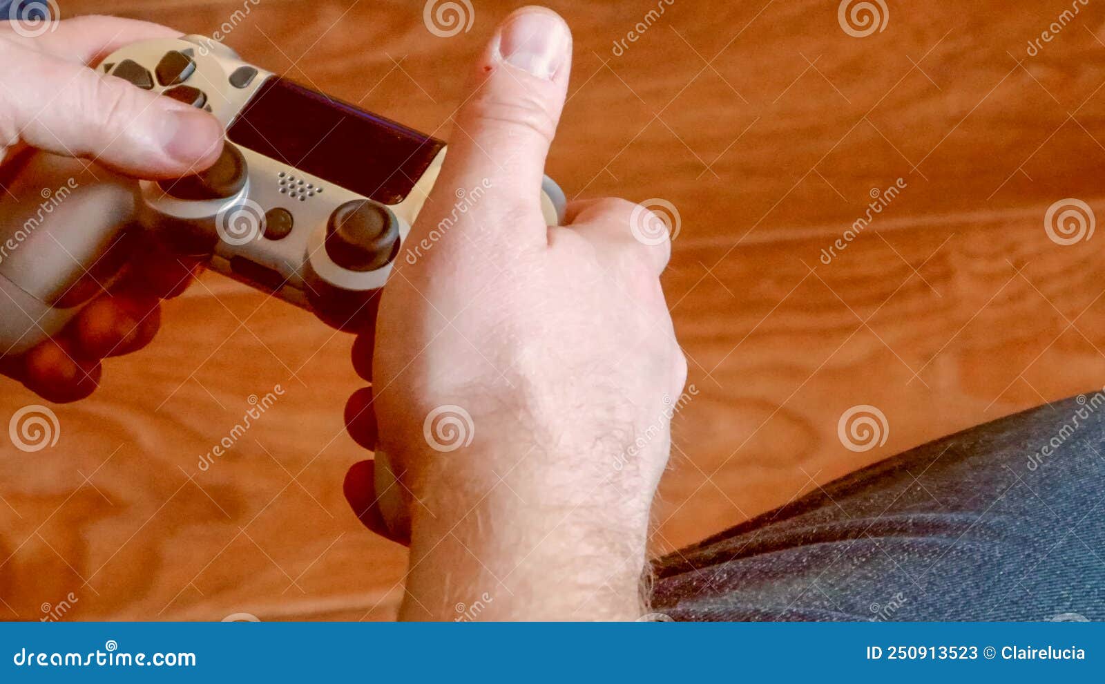 Using a Controller To Play Video Games - a Close-up of Hands and a ...