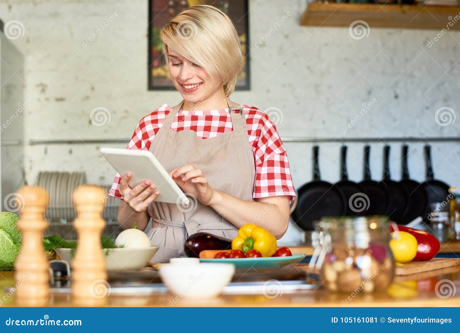 Using Digital Tablet in Kitchen Stock Image - Image of apron, standing ...