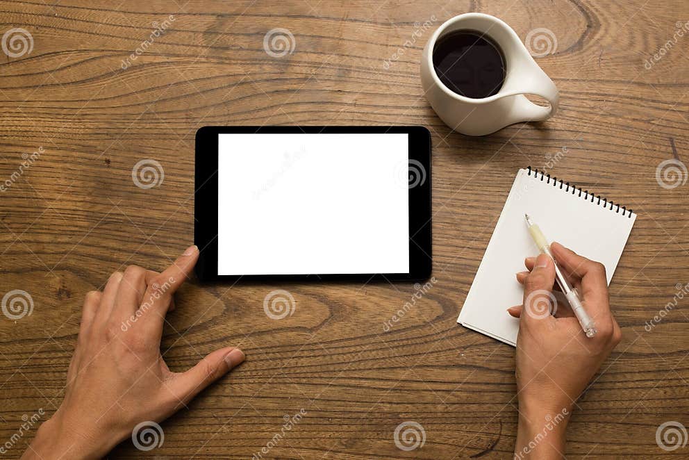 Using a Digital Tablet and Writing Notes with Coff Stock Photo - Image ...