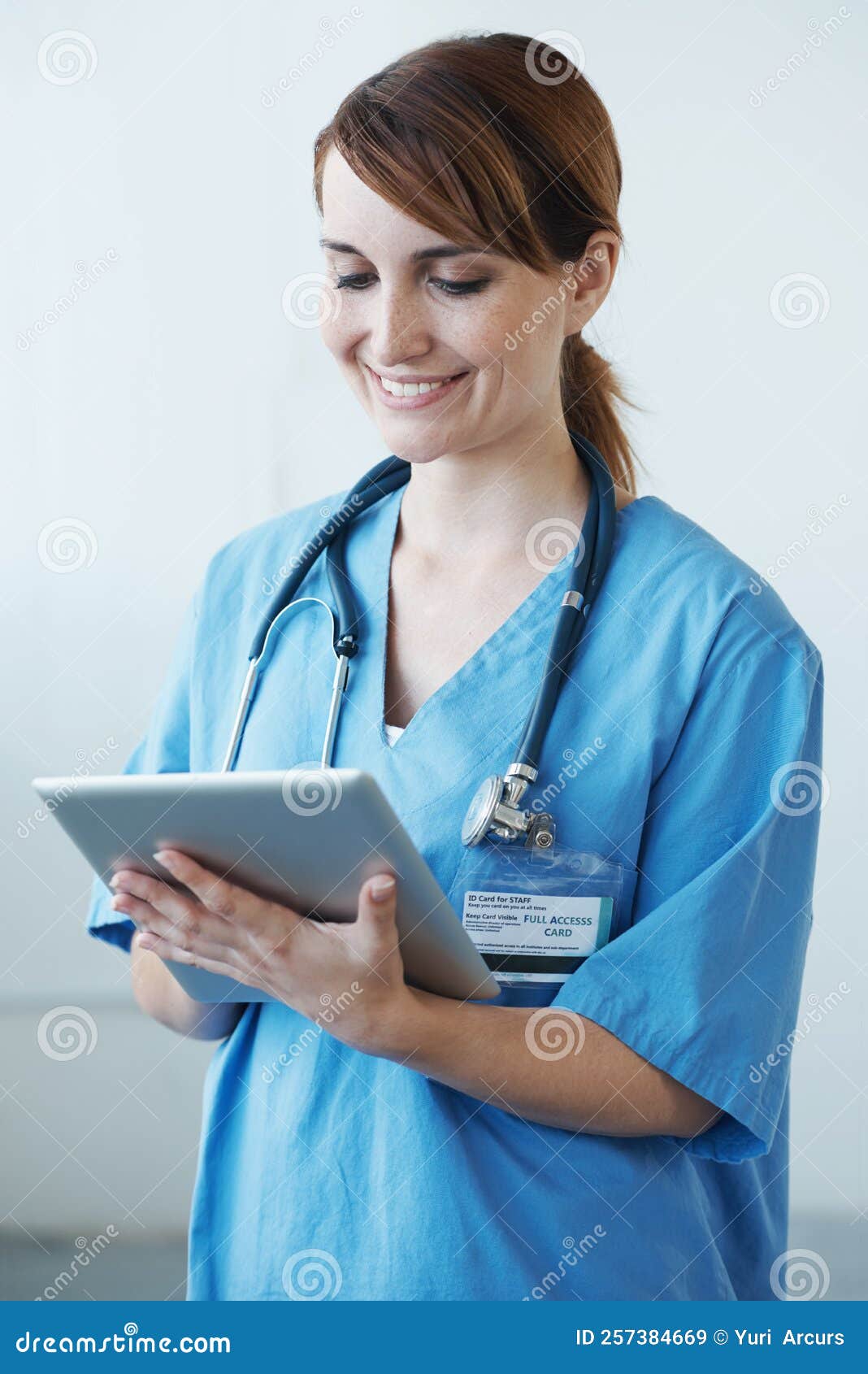 Using Digital Tools To Find a Solution. a Female Doctor Working on a ...