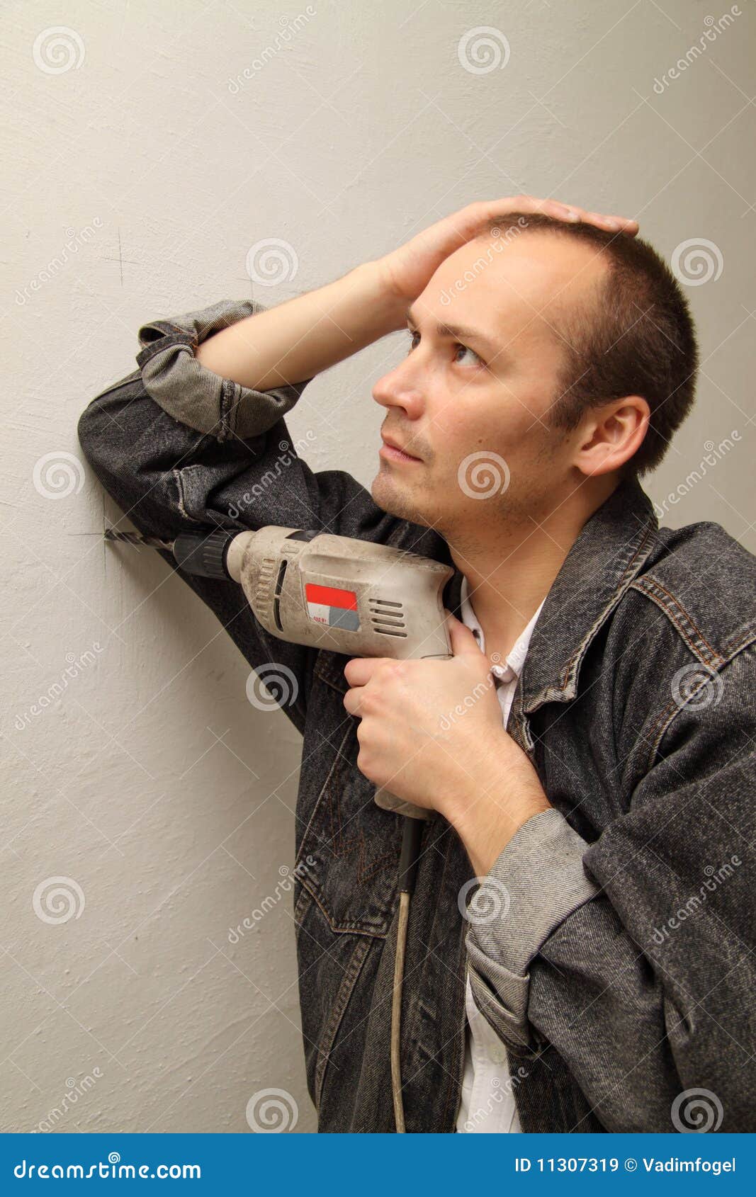 Using drill. Make repairs stock image. Image of house - 11307319