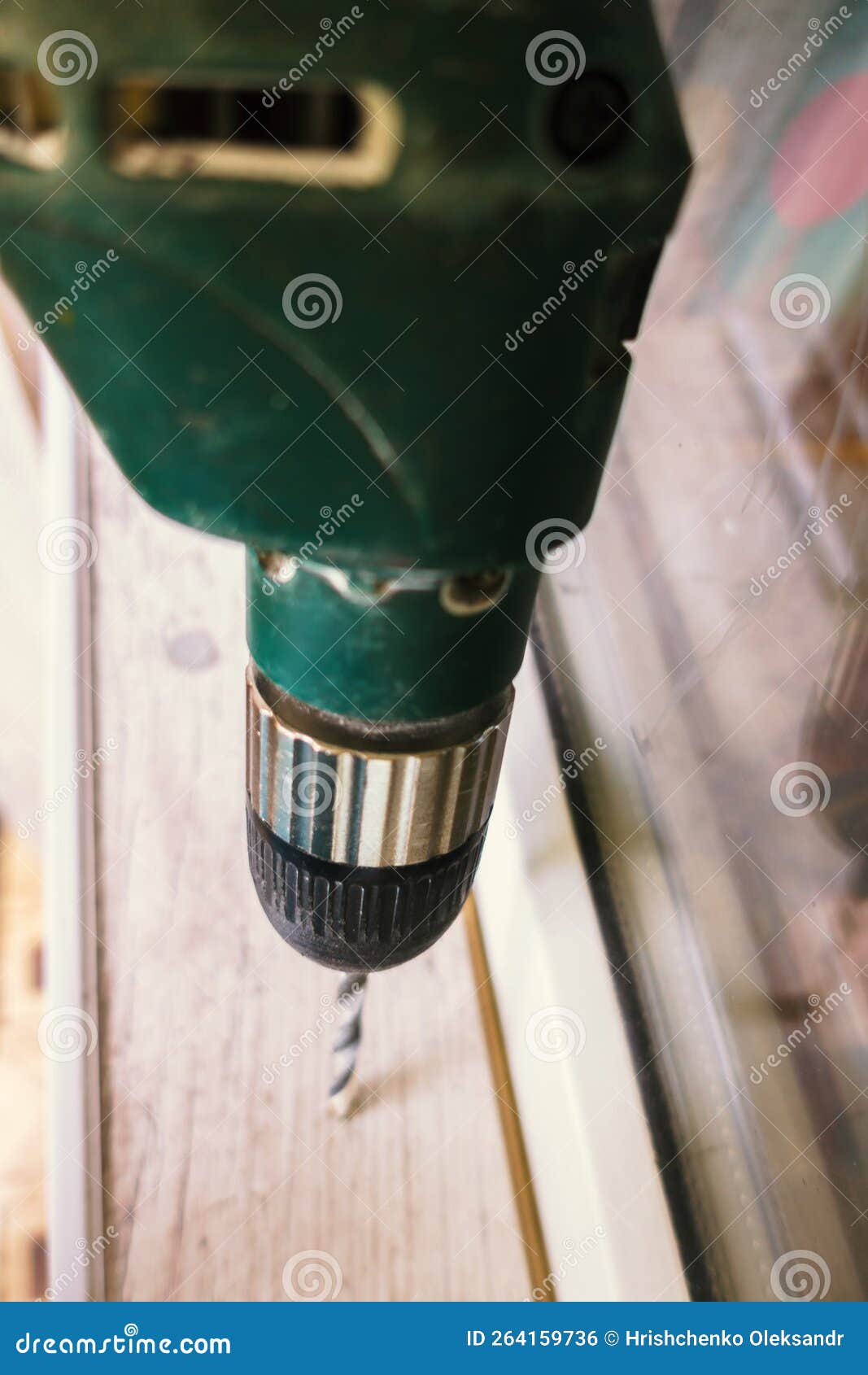 Using a Drill To Drill a Hole in a Board Stock Photo - Image of ...